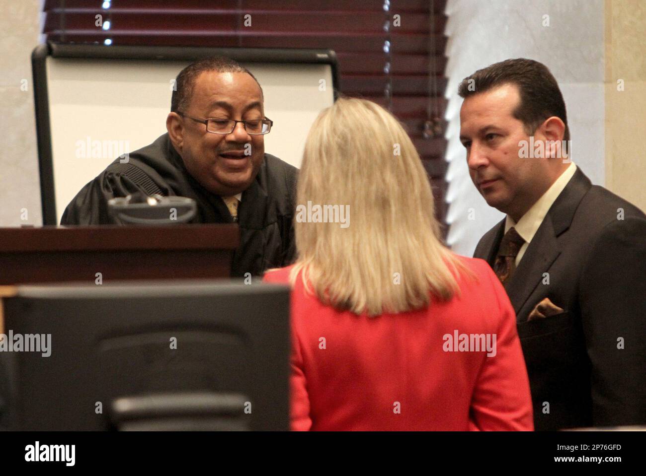 Judge Belvin Perry, left, talks with prosecution attorney Linda Drane ...