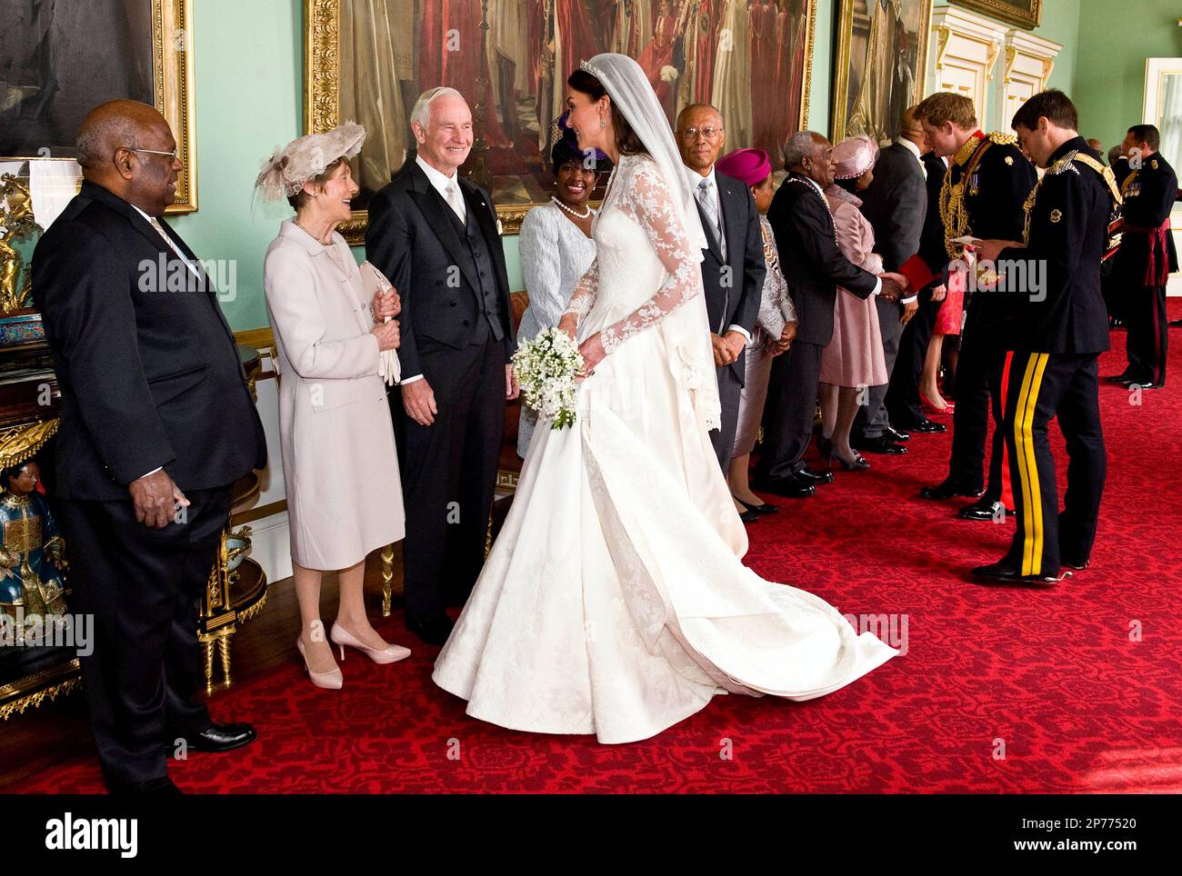 Kate, the Duchess of Cambridge, center, speaks with the Governor General of Canada David ...