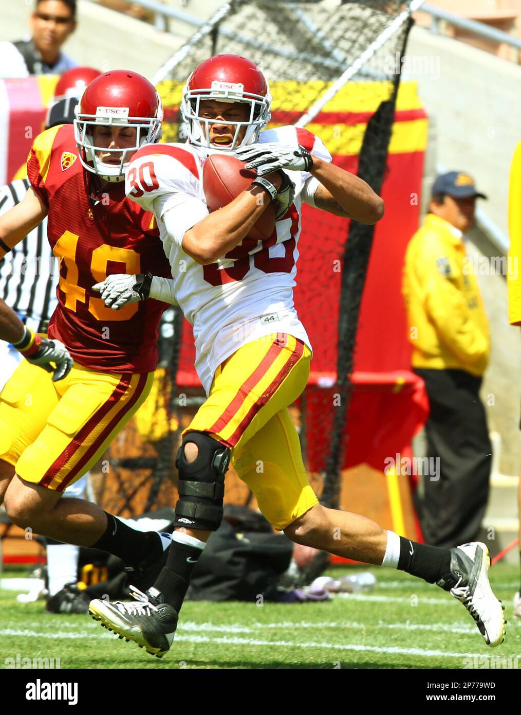 USC Trojans cornerback Brian Baucham (30) intercepts a pass during an ...