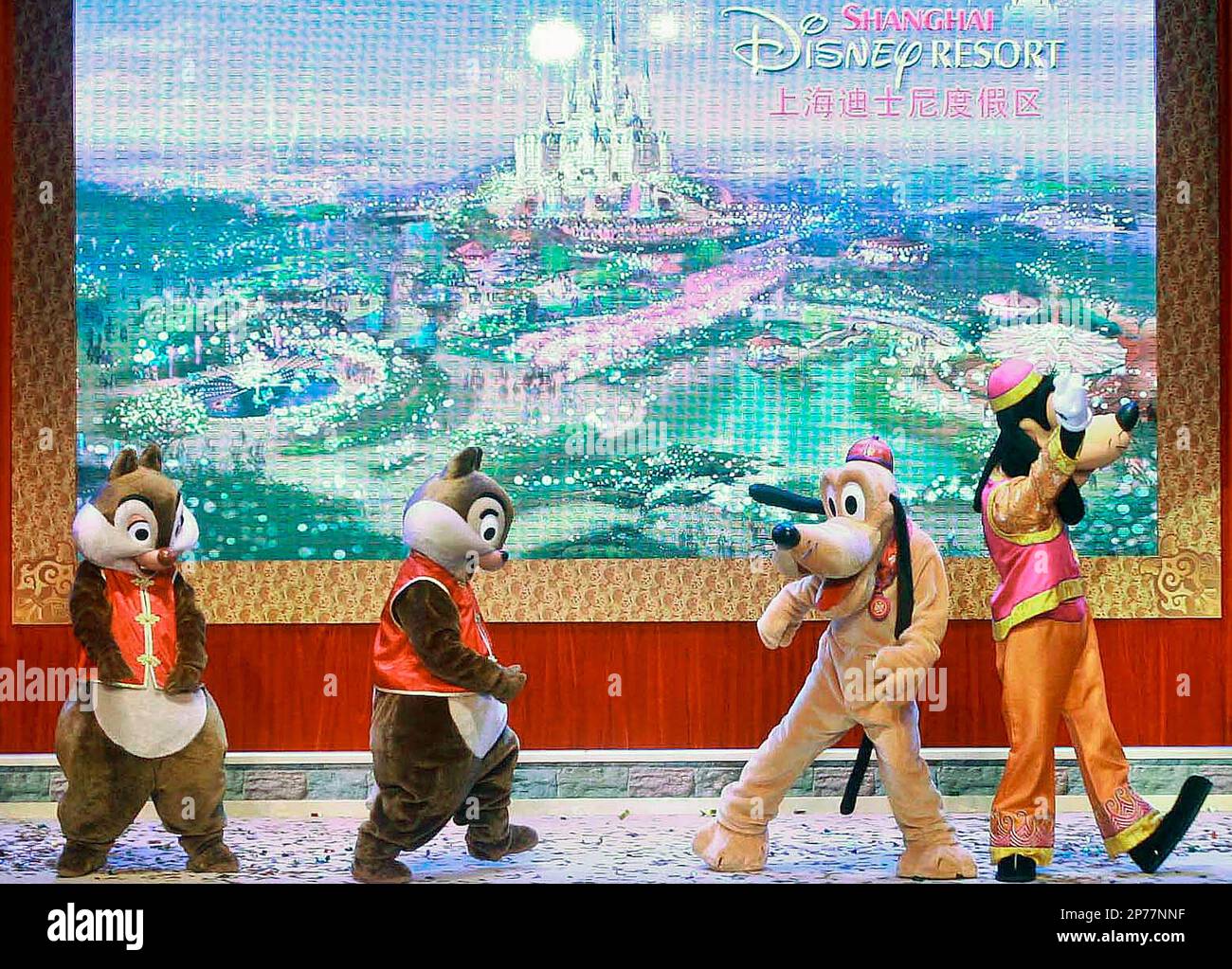 Disney cartoon characters perform during the ground-breaking ceremony ...