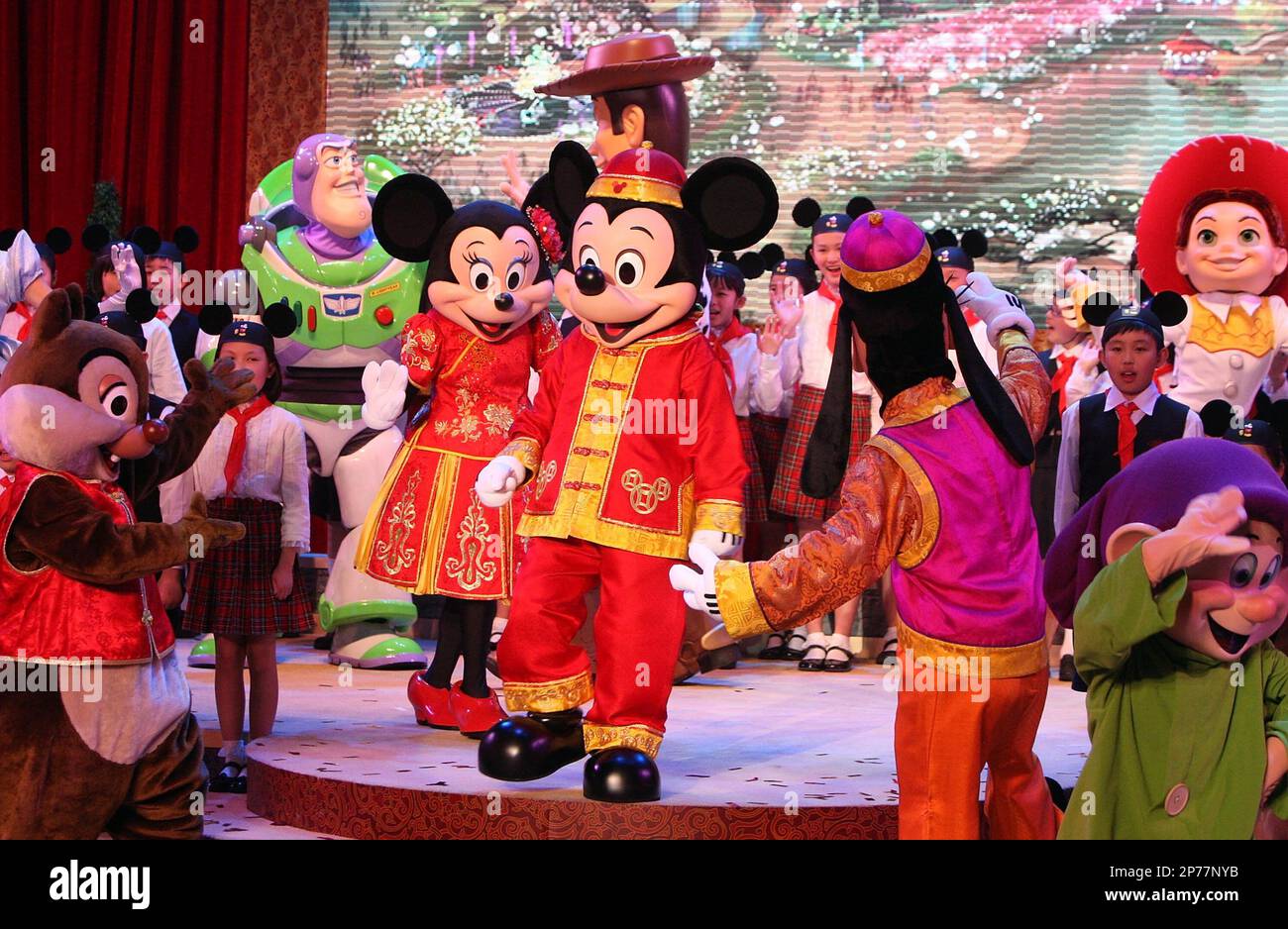 Disney cartoon characters perform during the ground-breaking ceremony ...