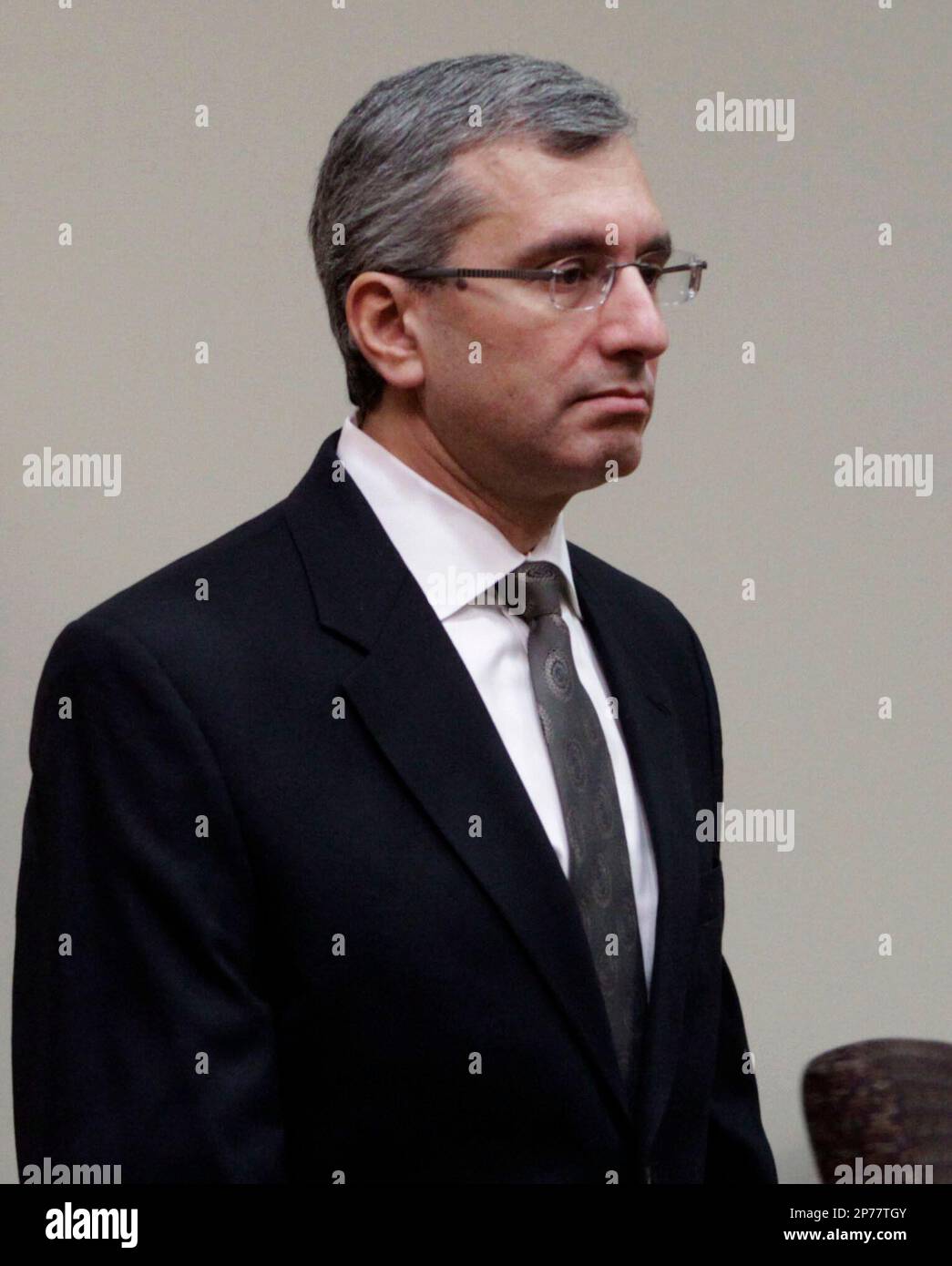 Hemy Neuman enters court for his hearing Monday, April 4, 2011 in ...