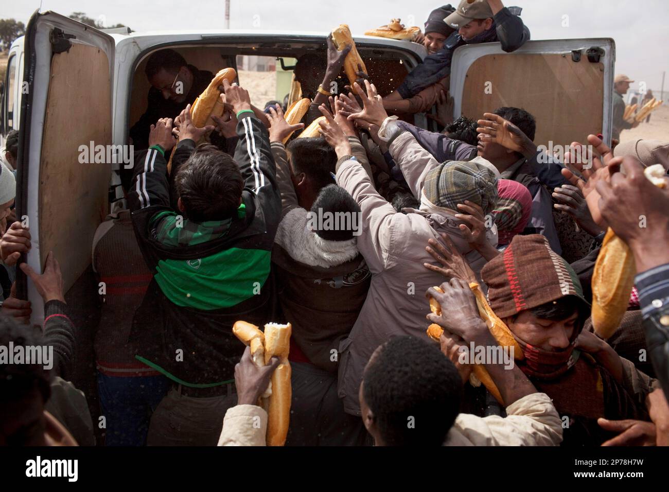 Men who used to work in Libya and fled the unrest in the country ...