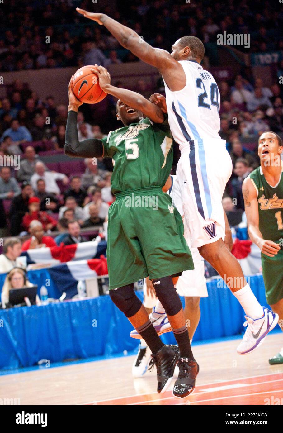 March 08 2011: USF guard Jawanza Poland (5) drives toward the basket ...