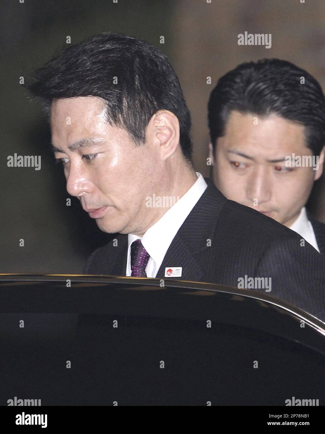 Foreign Minister Seiji Maehara leaves the Prime Minister's official residence after he delivered ...