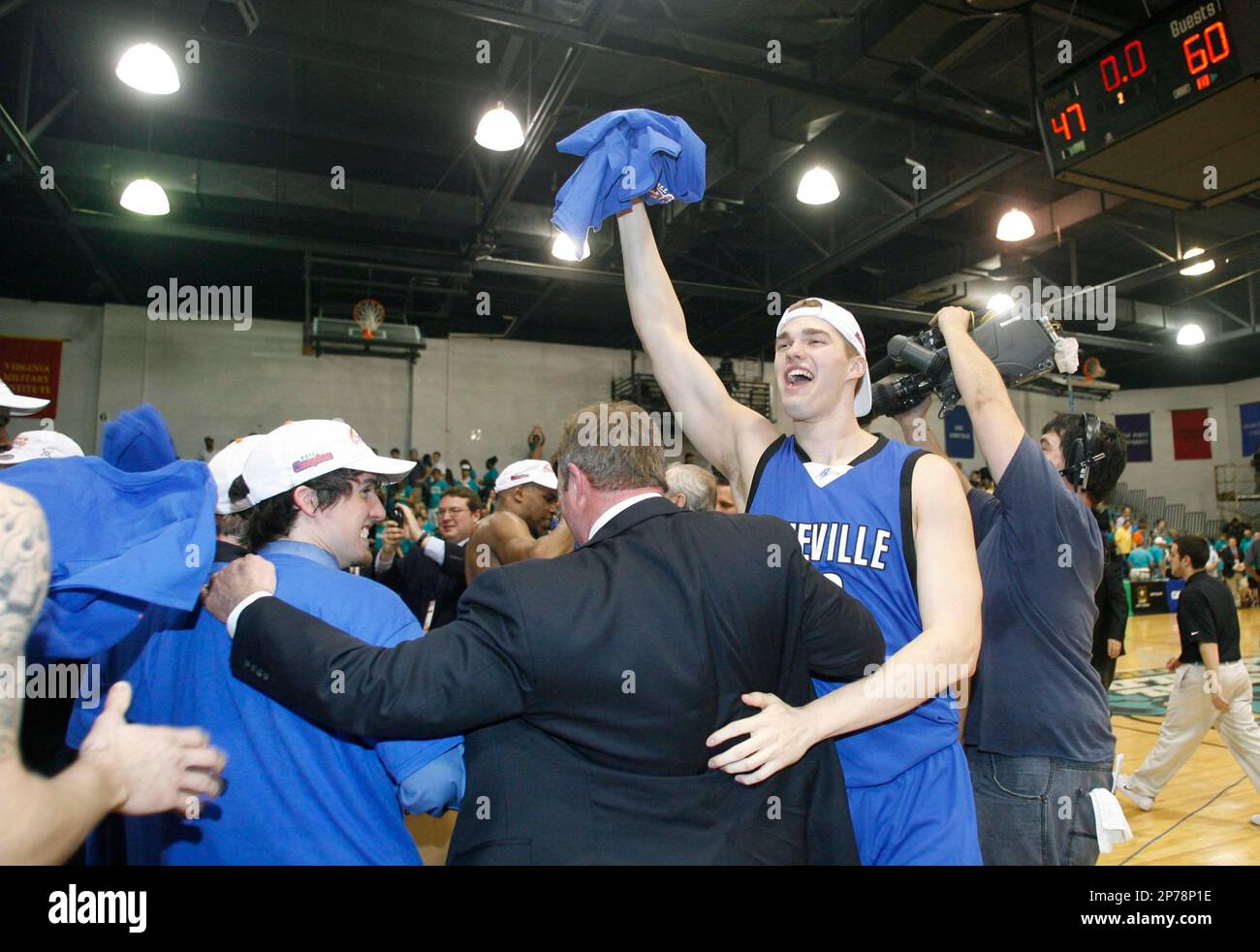 UNC-Asheville's Jeremy Ham celebrates with teammates after defeating ...