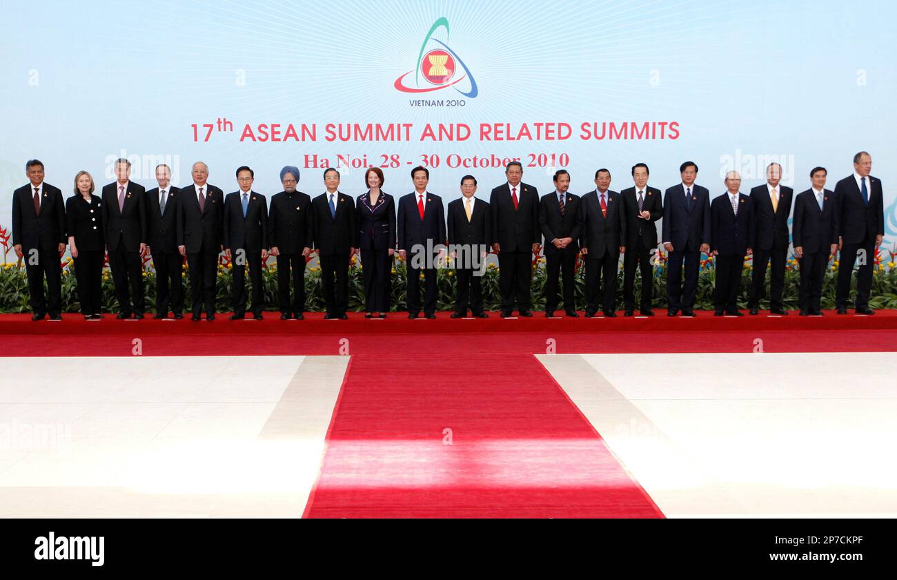 Asian and visiting leaders pose for a group photo during the 17th ASEAN ...