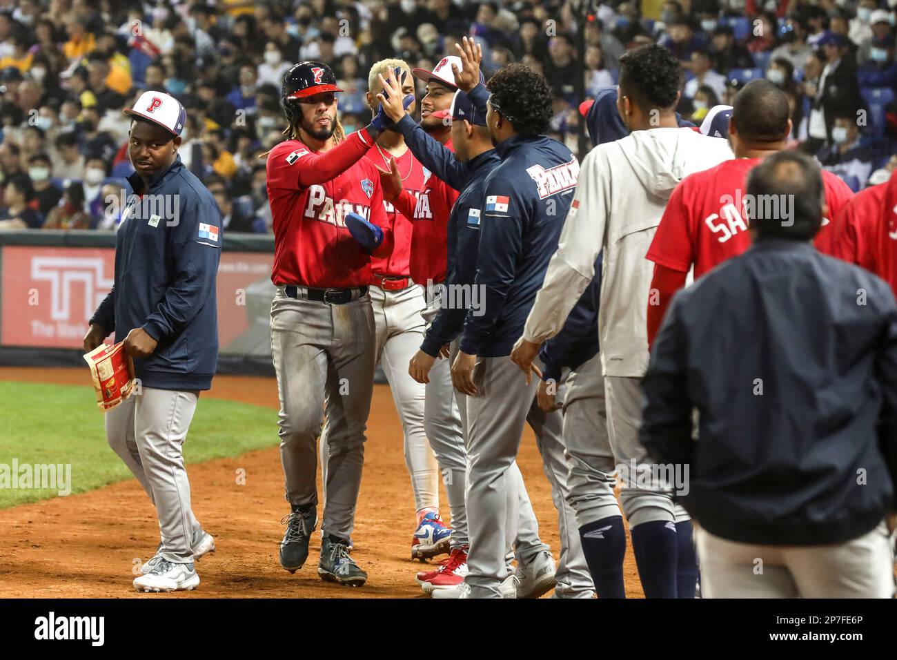 Panama team gives give high to each other to celebrate the team's 12-5 ...