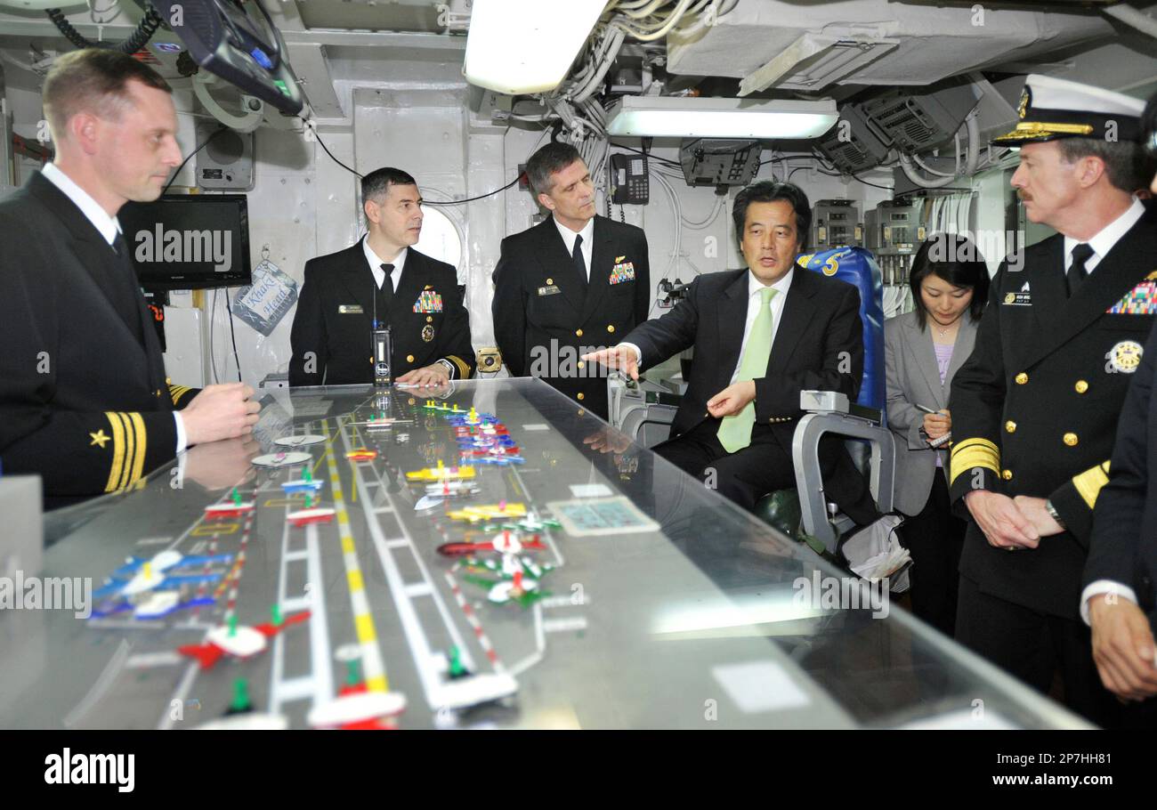 Japan's Foreign Minister Katsuya Okada, third right, visits the flight ...