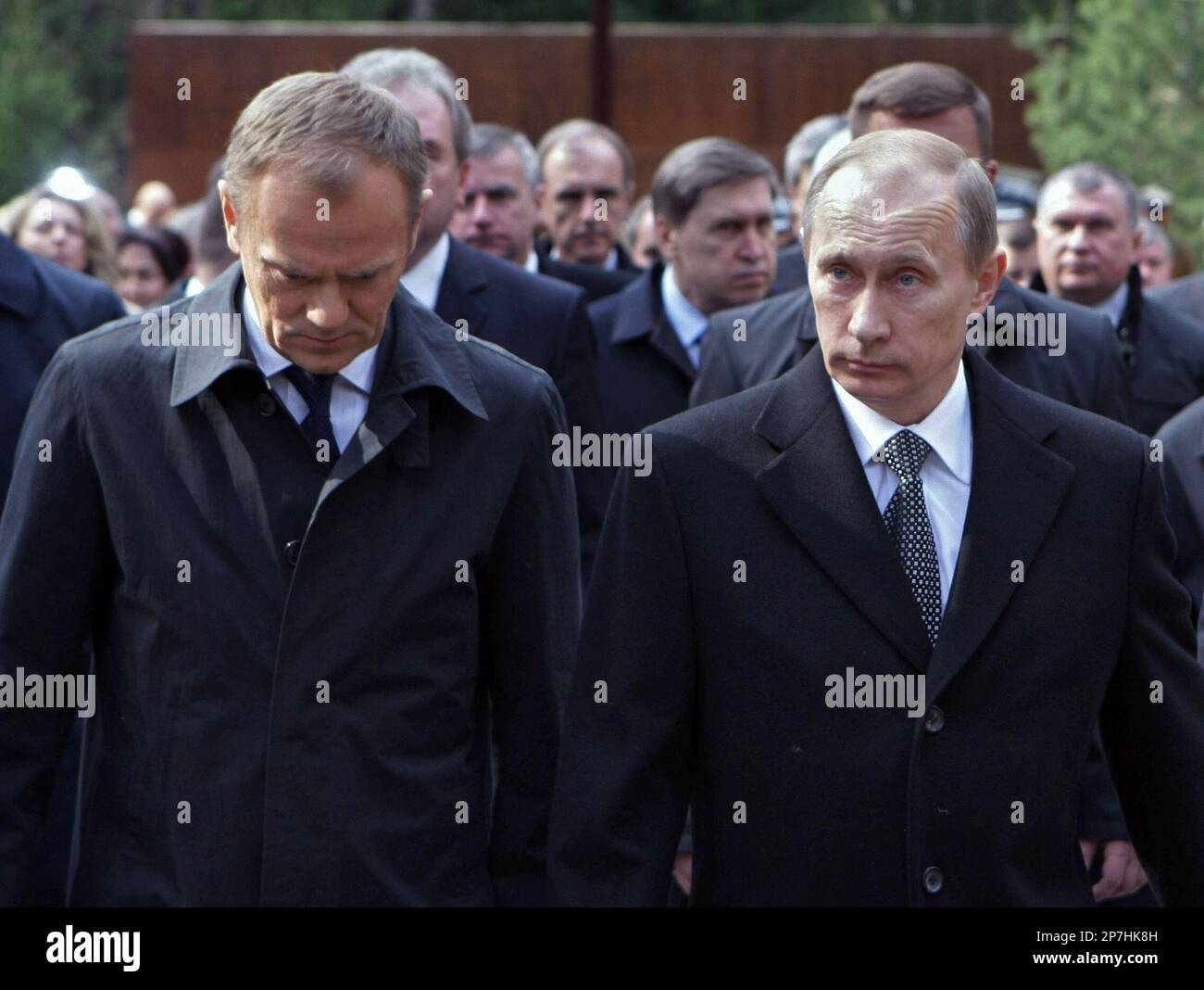 Russian Prime Minister Vladimir Putin, right, and Polish Prime Minister ...