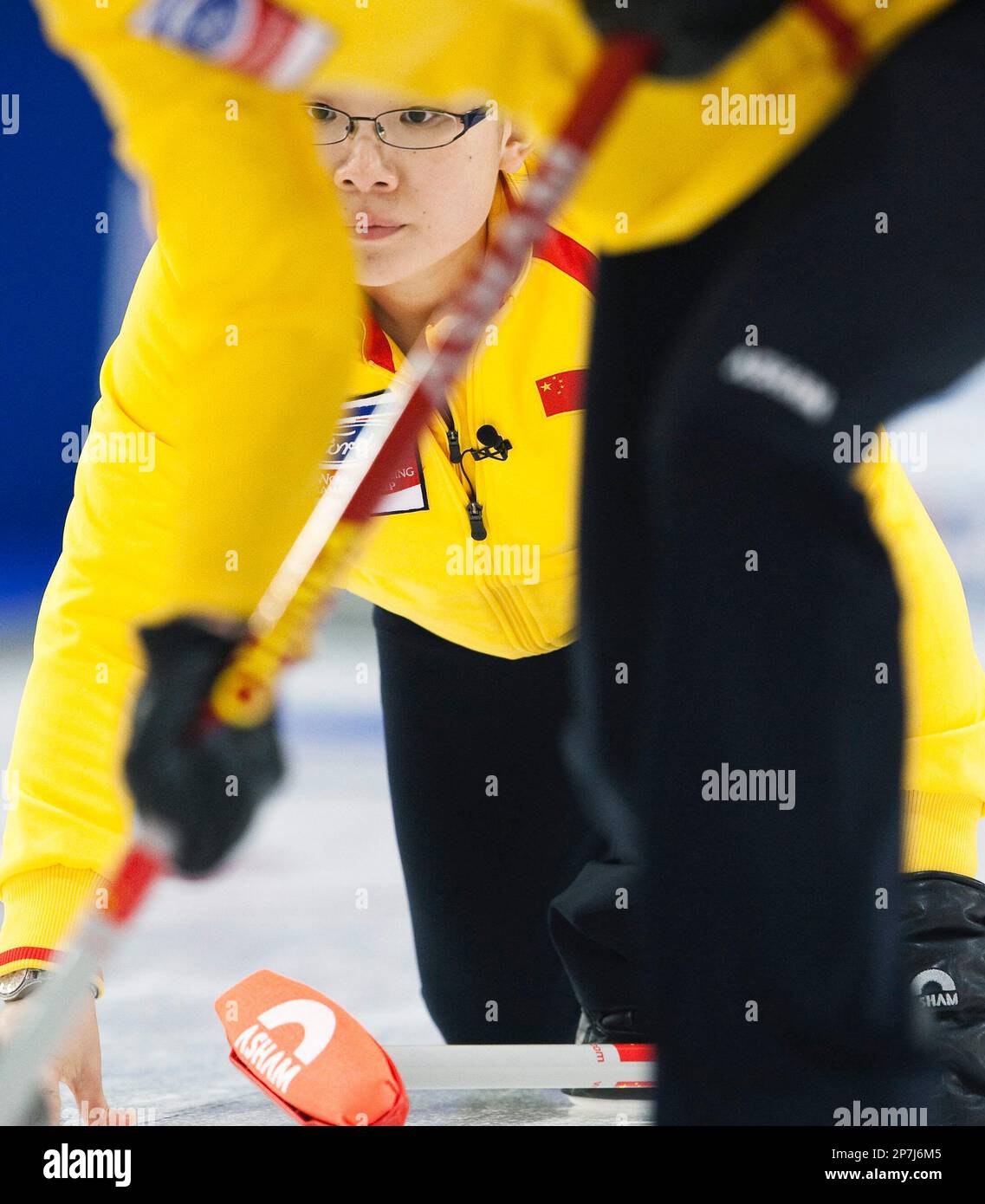 China skip Bingyu Wang watches her rock curl while playing against ...