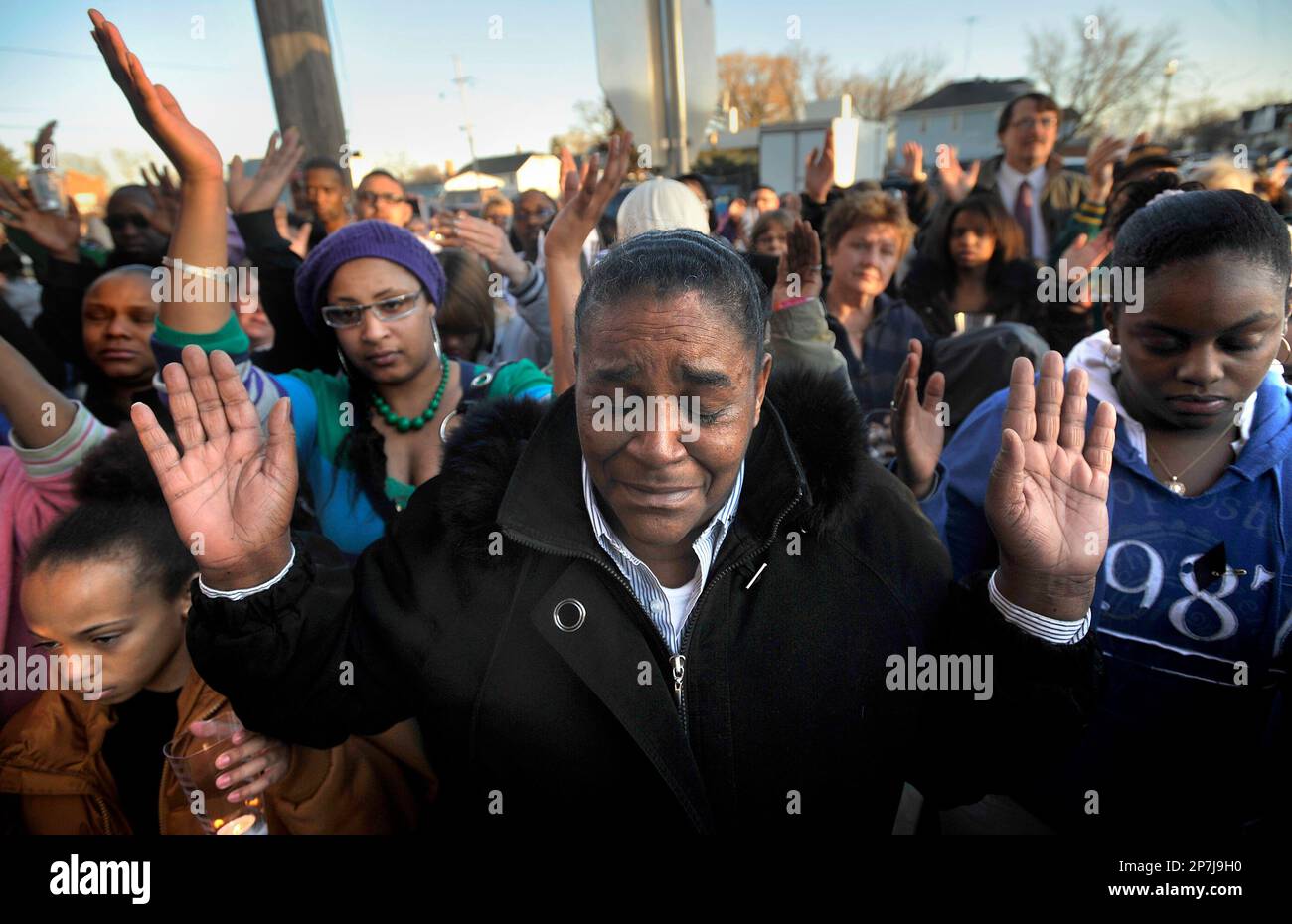 In this March 17, 2010 photo, friends and relatives of Mohammed ...