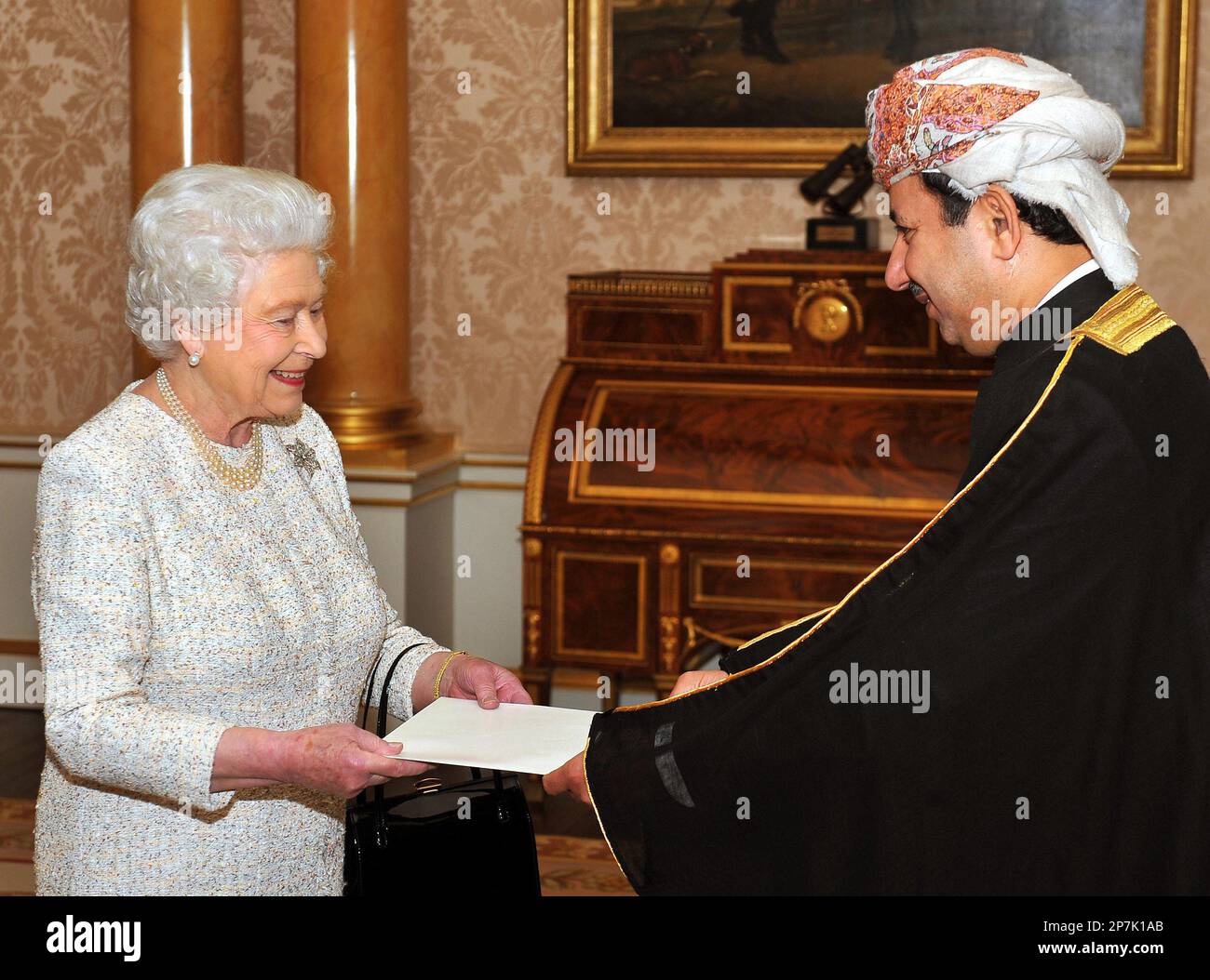 Britain's Queen Elizabeth II receives the Ambassador of Oman, Abdulaziz ...