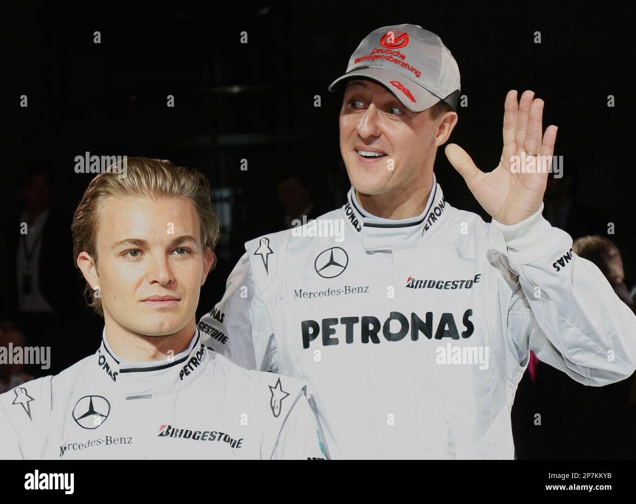 German Formula One driver Michael Schumacher, right, greets his wife ...