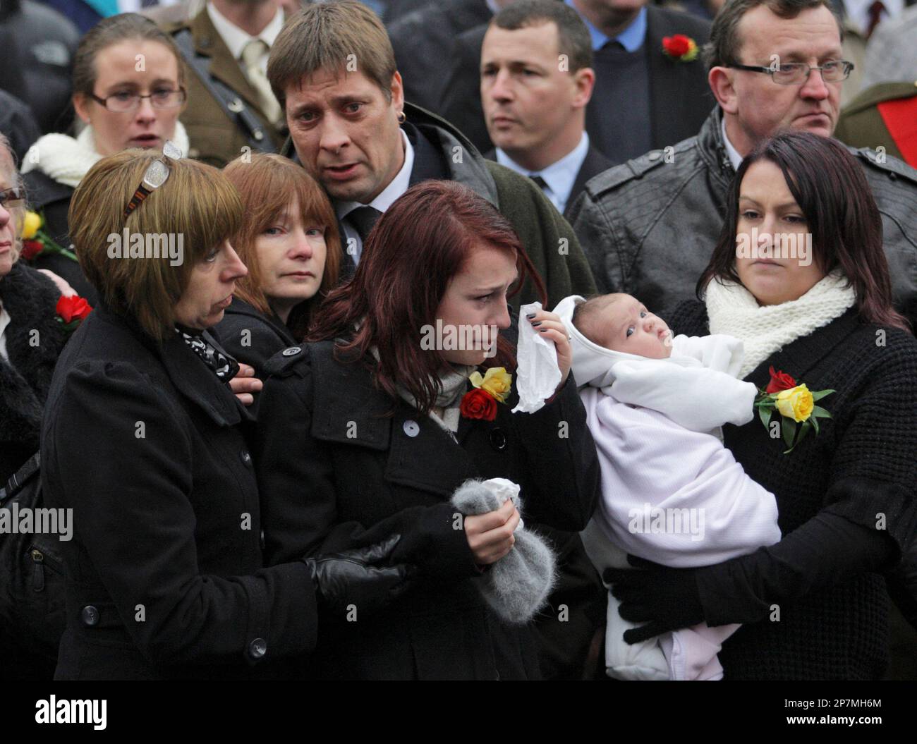 Sian Goodenough, the fiancee of Lance Corporal Adam Drane, front center ...