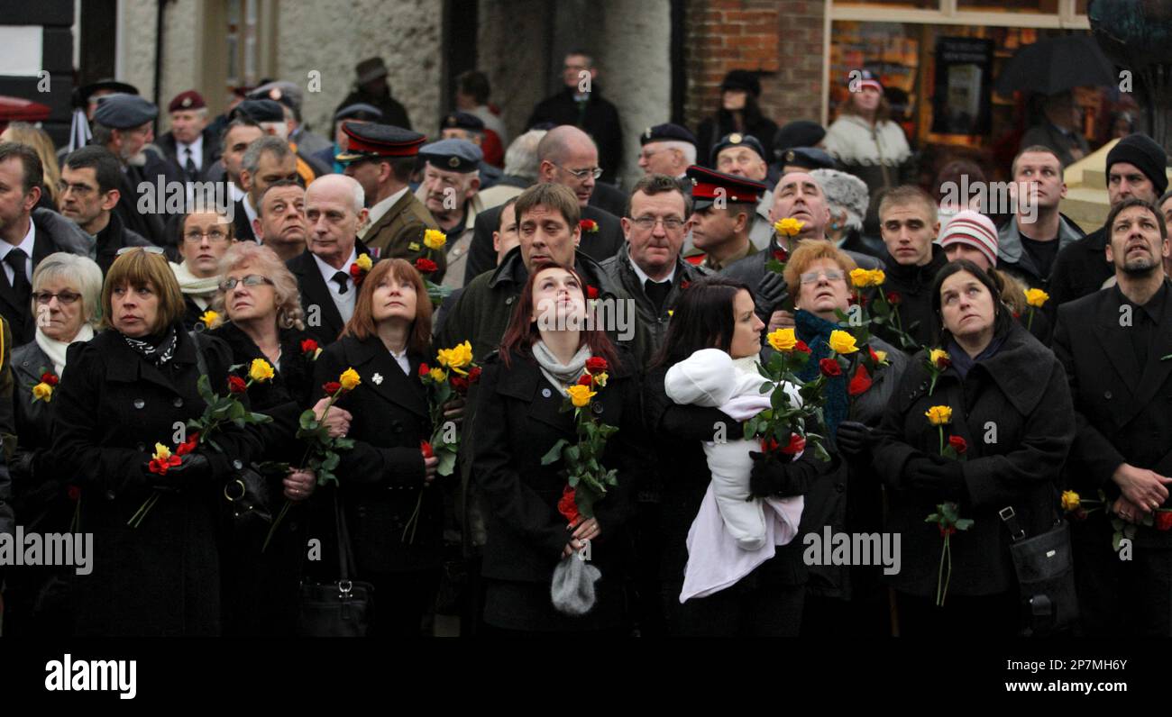 Sian Goodenough, center, the fiancee of Lance Corporal Adam Drane ...