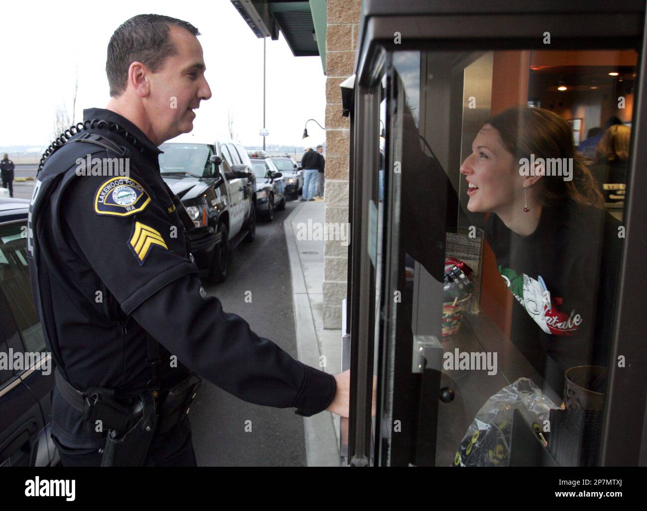 Lakewood police officer Mark Eakes is the first to place an order at ...