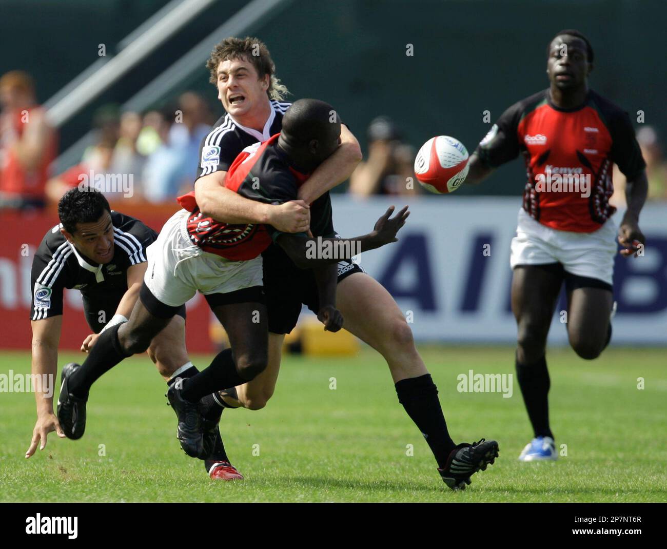 New Zealand's Kurt Baker tackles Kenya's Sidney Ashioya during the ...