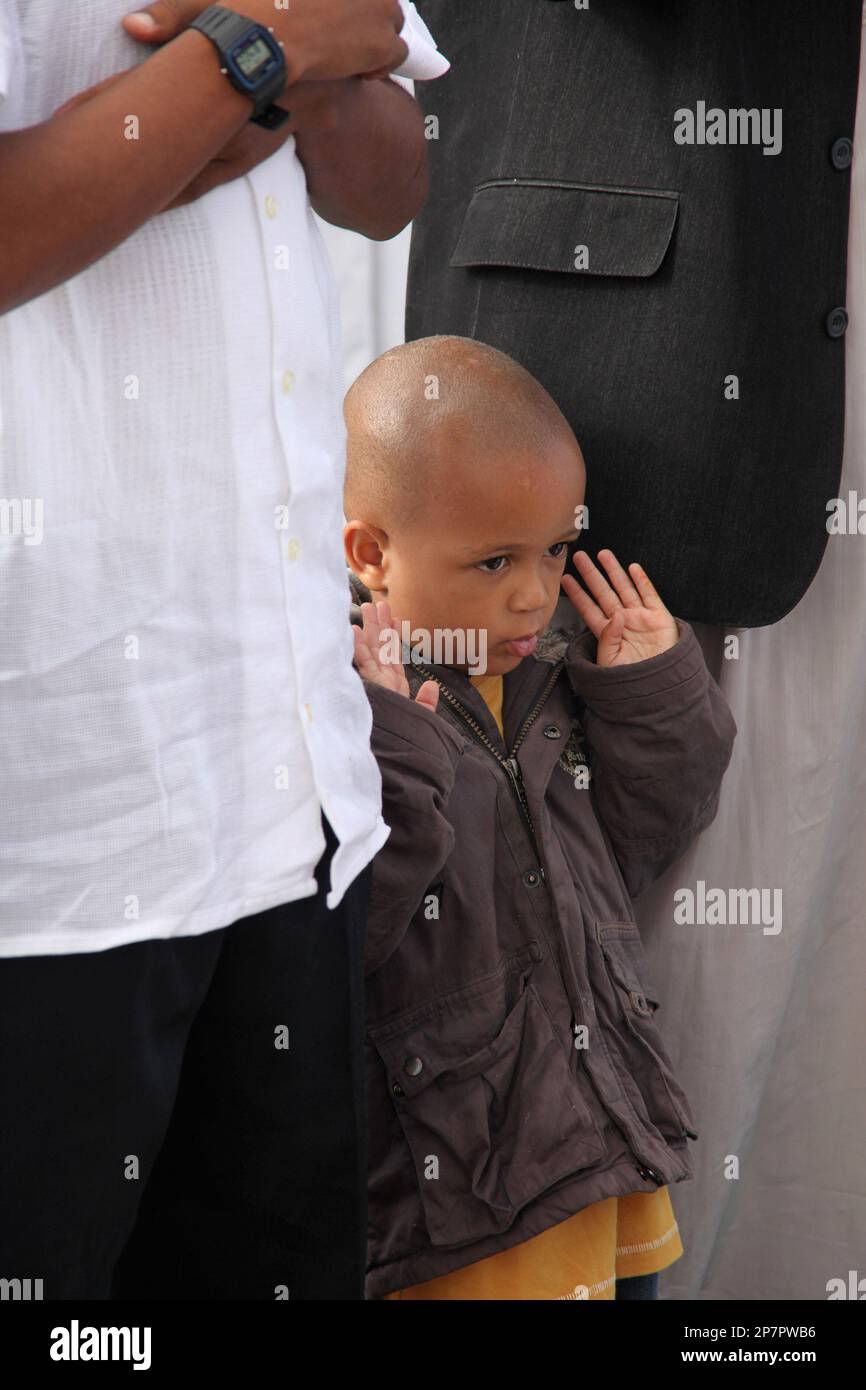 A Muslim child offers prayers to celebrate Eid al-Adha, or Feast of ...