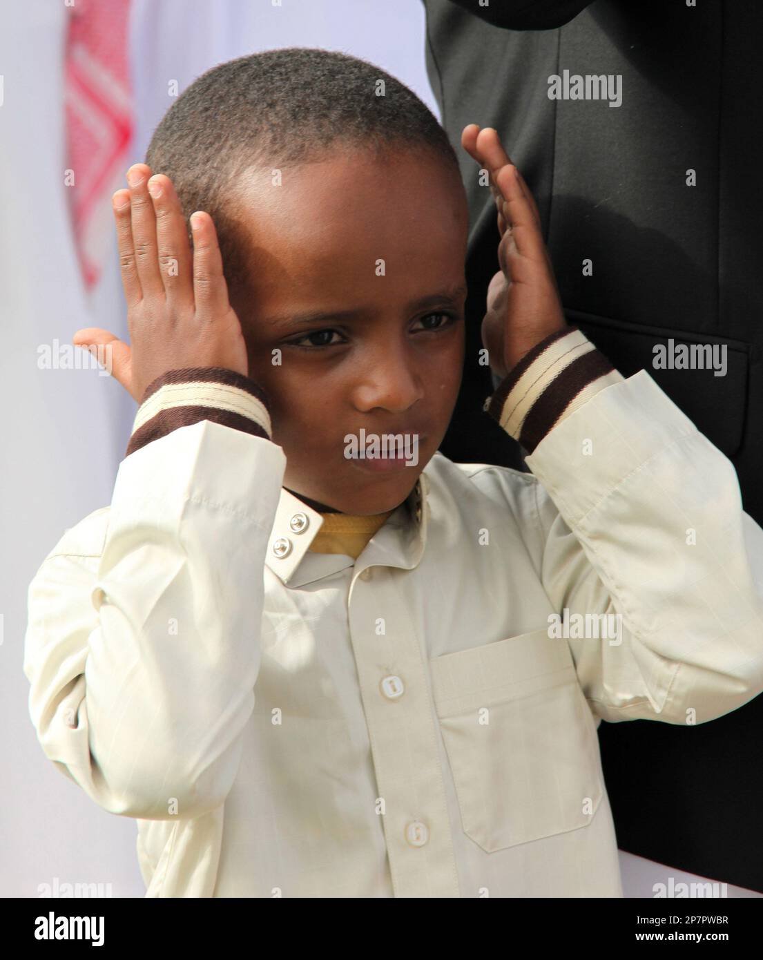 A Muslim child offers prayers to celebrate Eid al-Adha, or Feast of ...