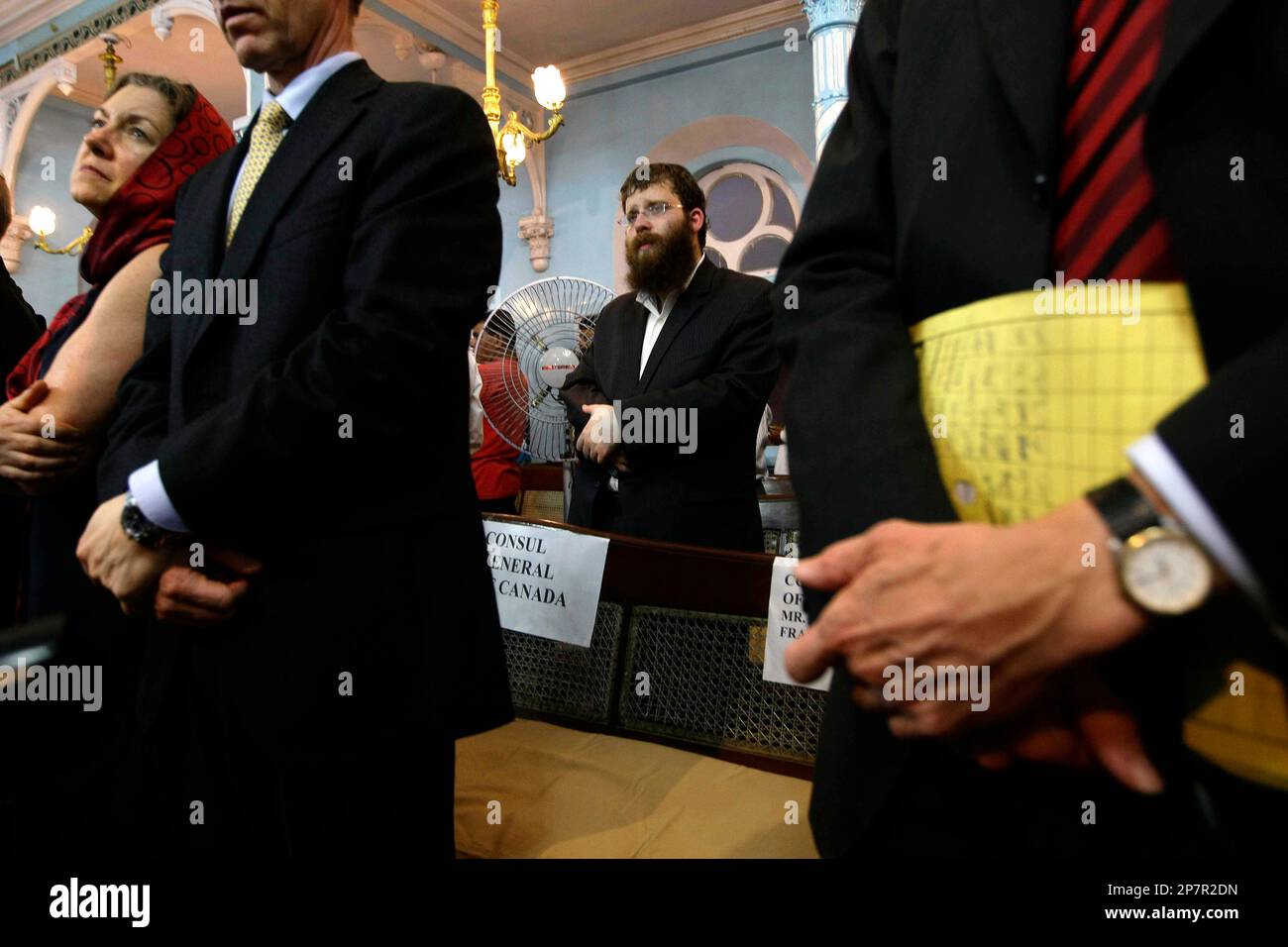 People attends special prayers for the Rabbi and his wife who were ...