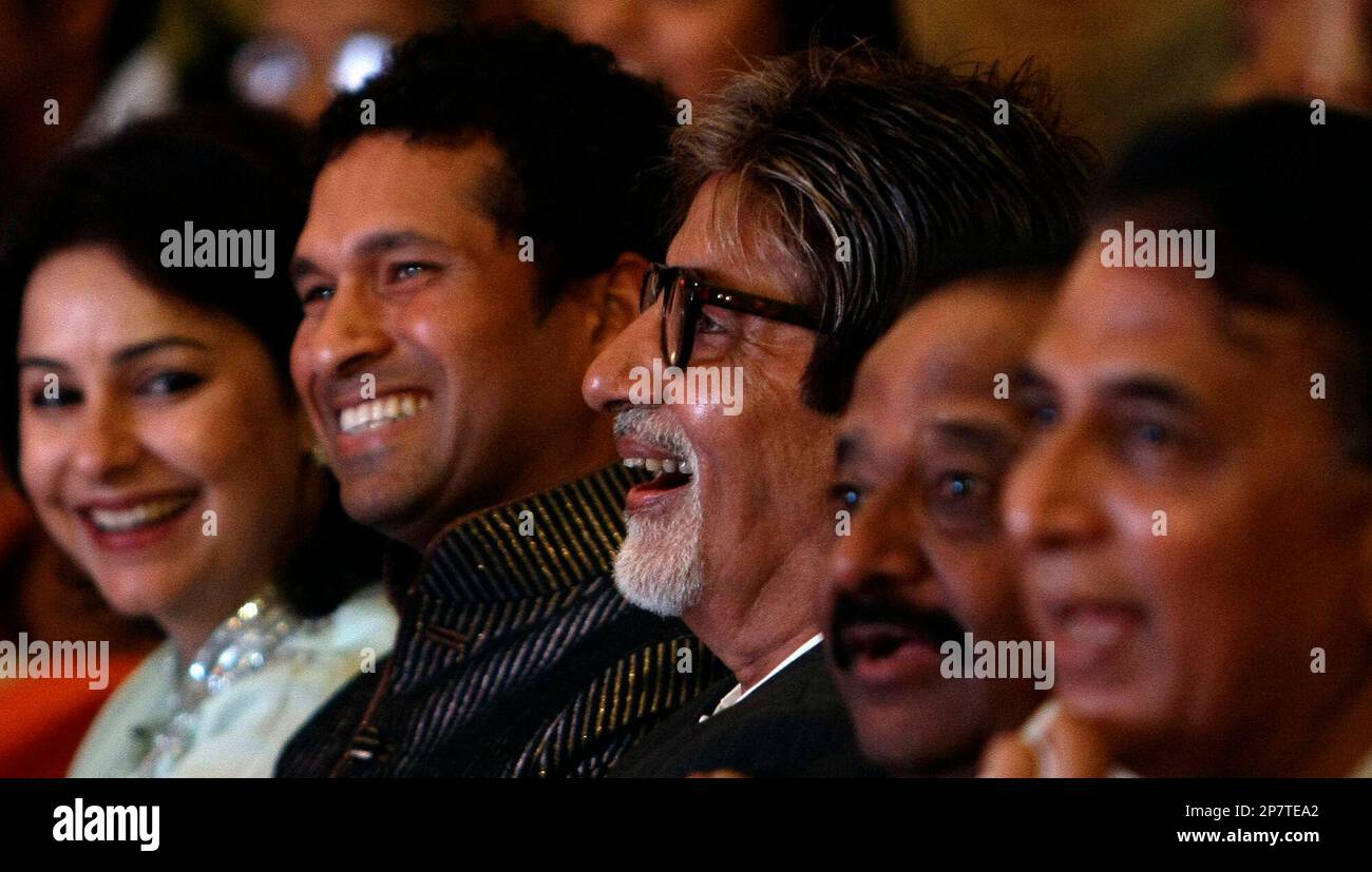 Bollywood icon Amitabh Bachchan, center, Indian cricket player Sachin ...