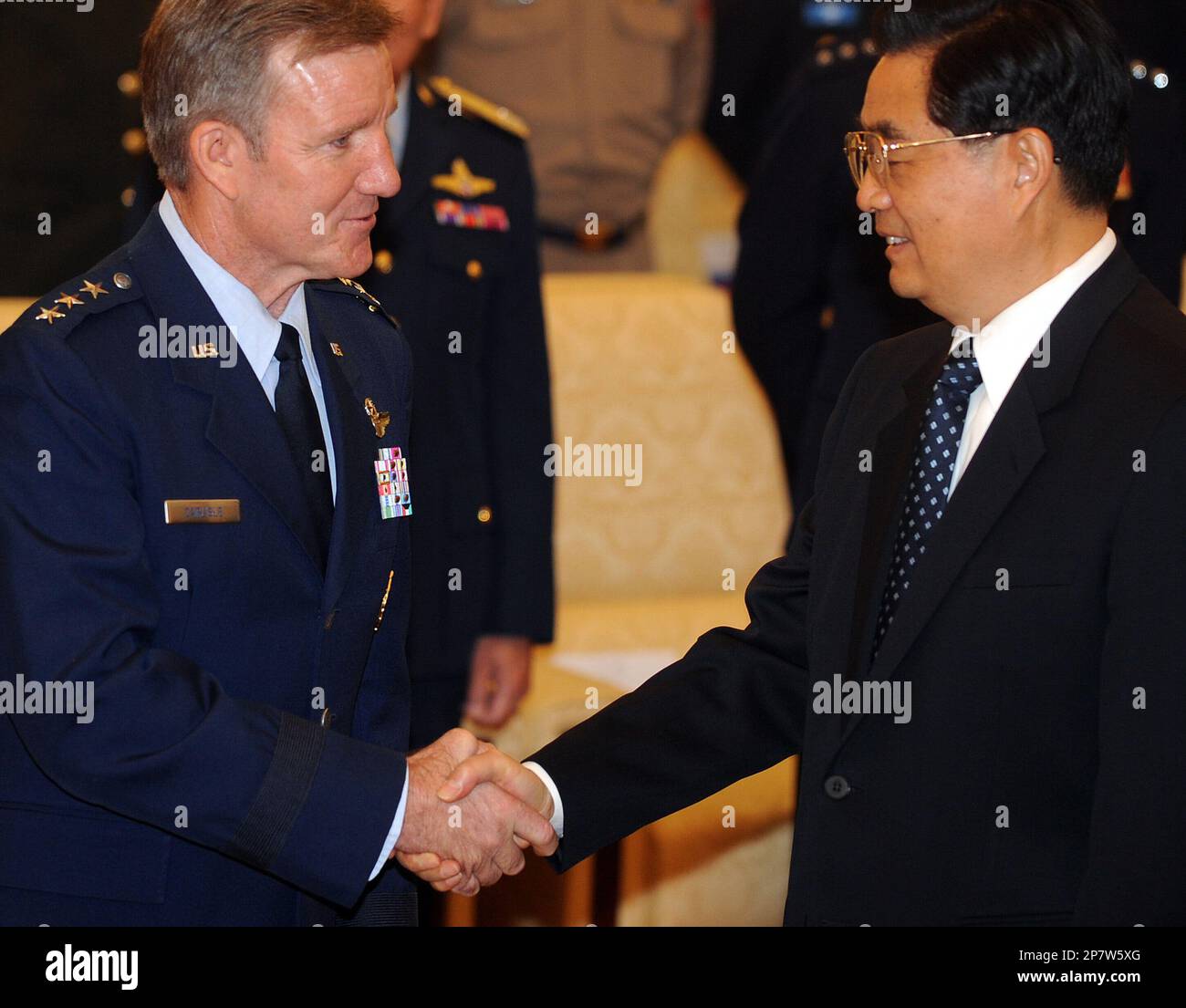 Chinese President Hu Jintao, right, meets with Lt. Gen. Herbert J ...