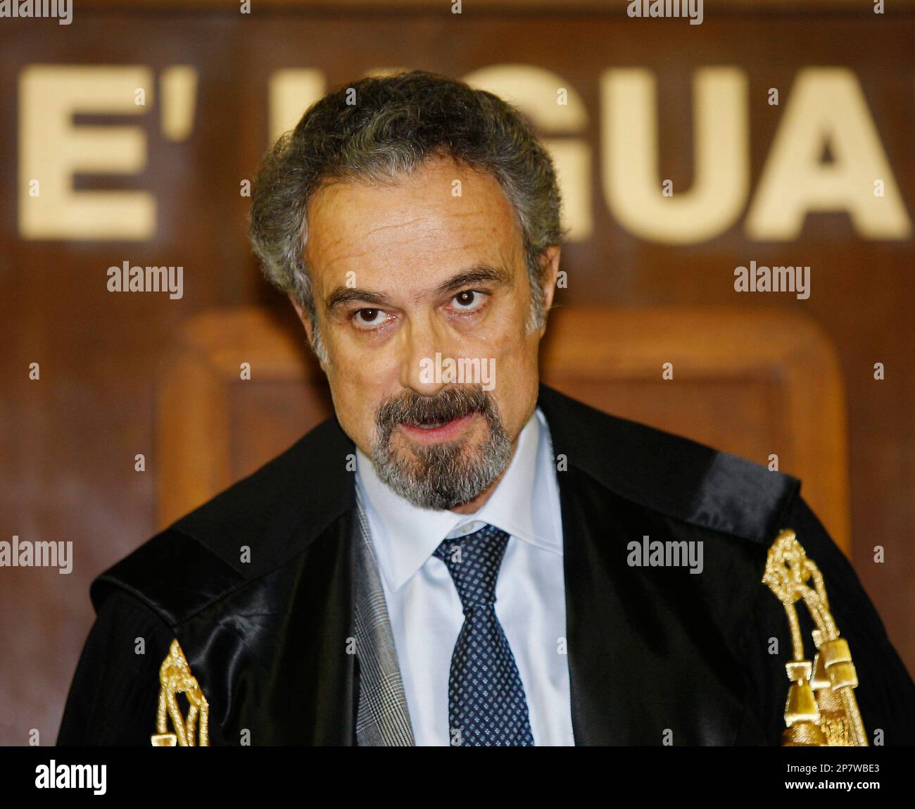 Italian Judge Oscar Magi reads the verdict at the Milan court, Italy ...