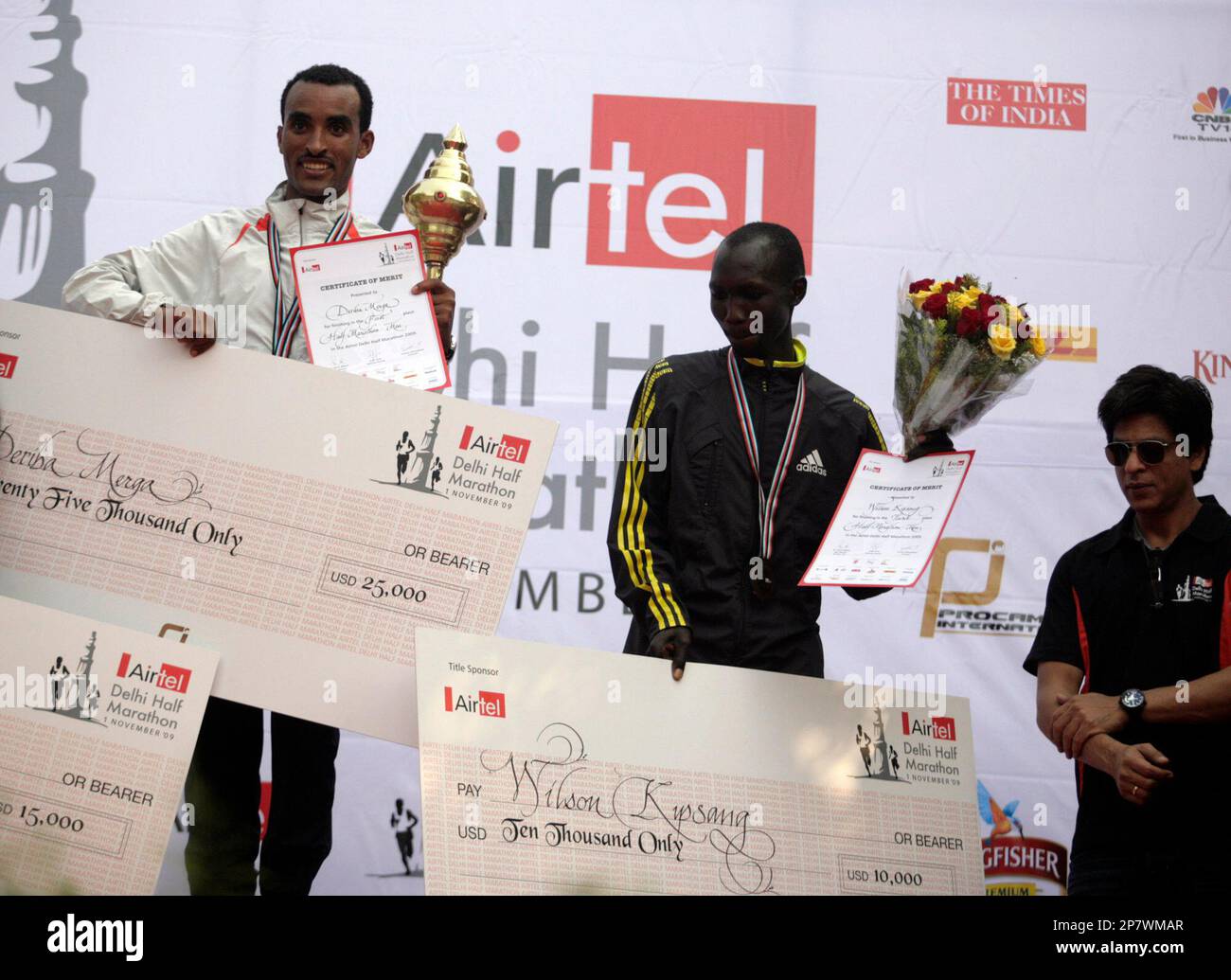 Winner, Ethiopia's Deriba Merga, left, and third place winner, Kenya's ...