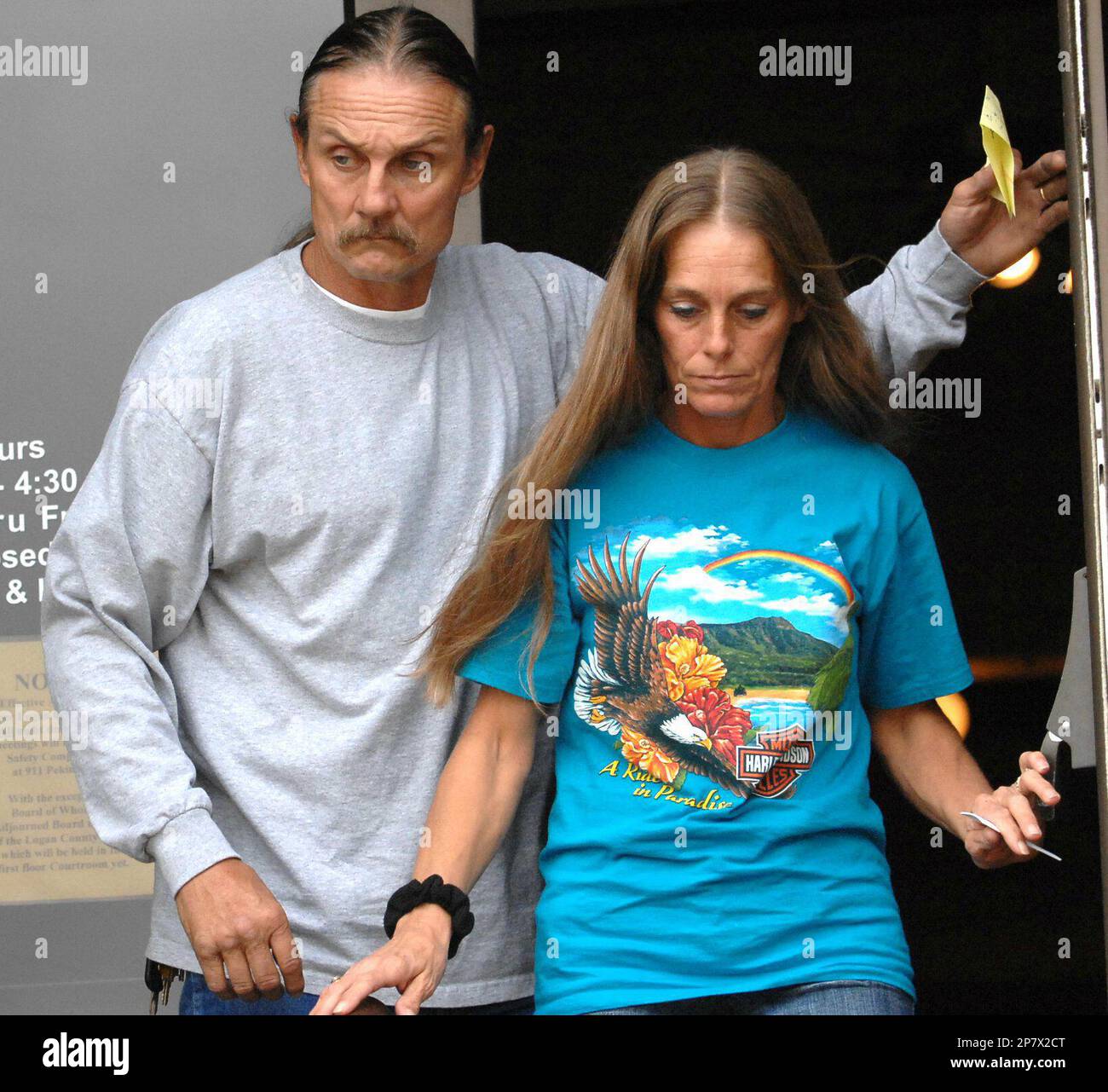 Gerald and Terry Miller leave the Logan County Courthouse in Lincoln ...