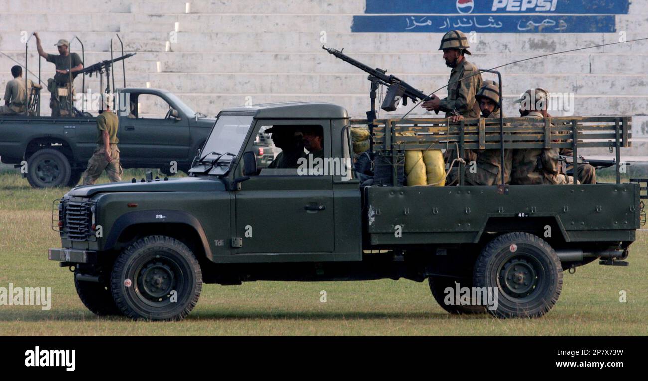 Pakistan's army troops arrive after patrolling on the vicinity of food ...
