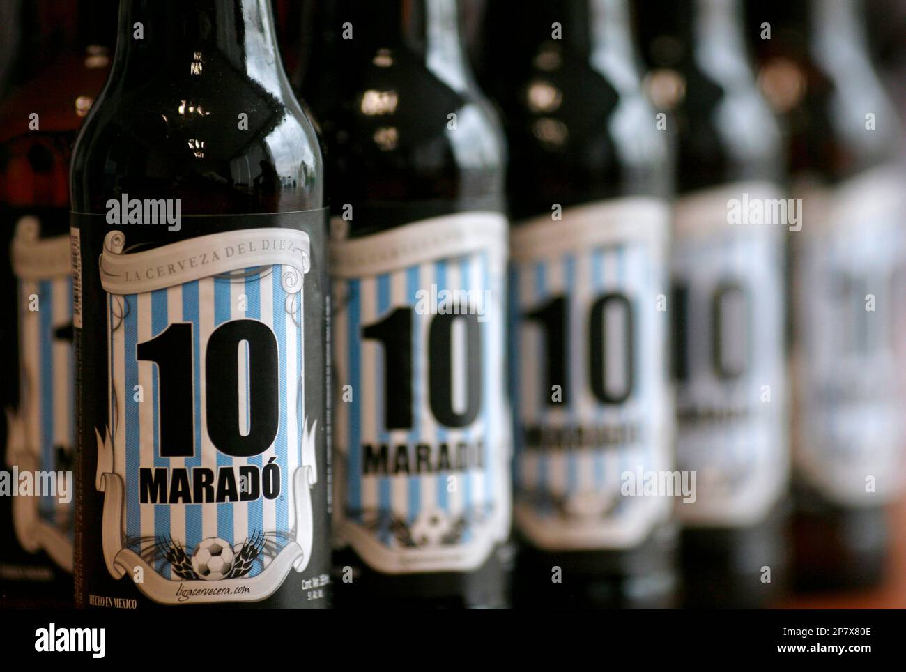 Bottles of the soon to be sold "10 Marado" beer sit at "Cerveceria ...