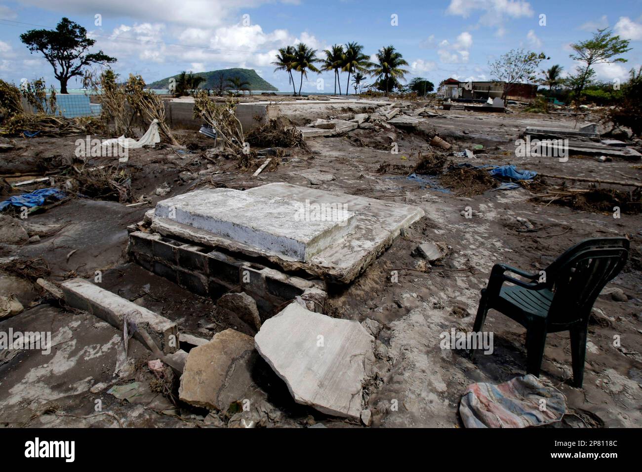The cement top of a grave is dislodged and the body is missing at ...