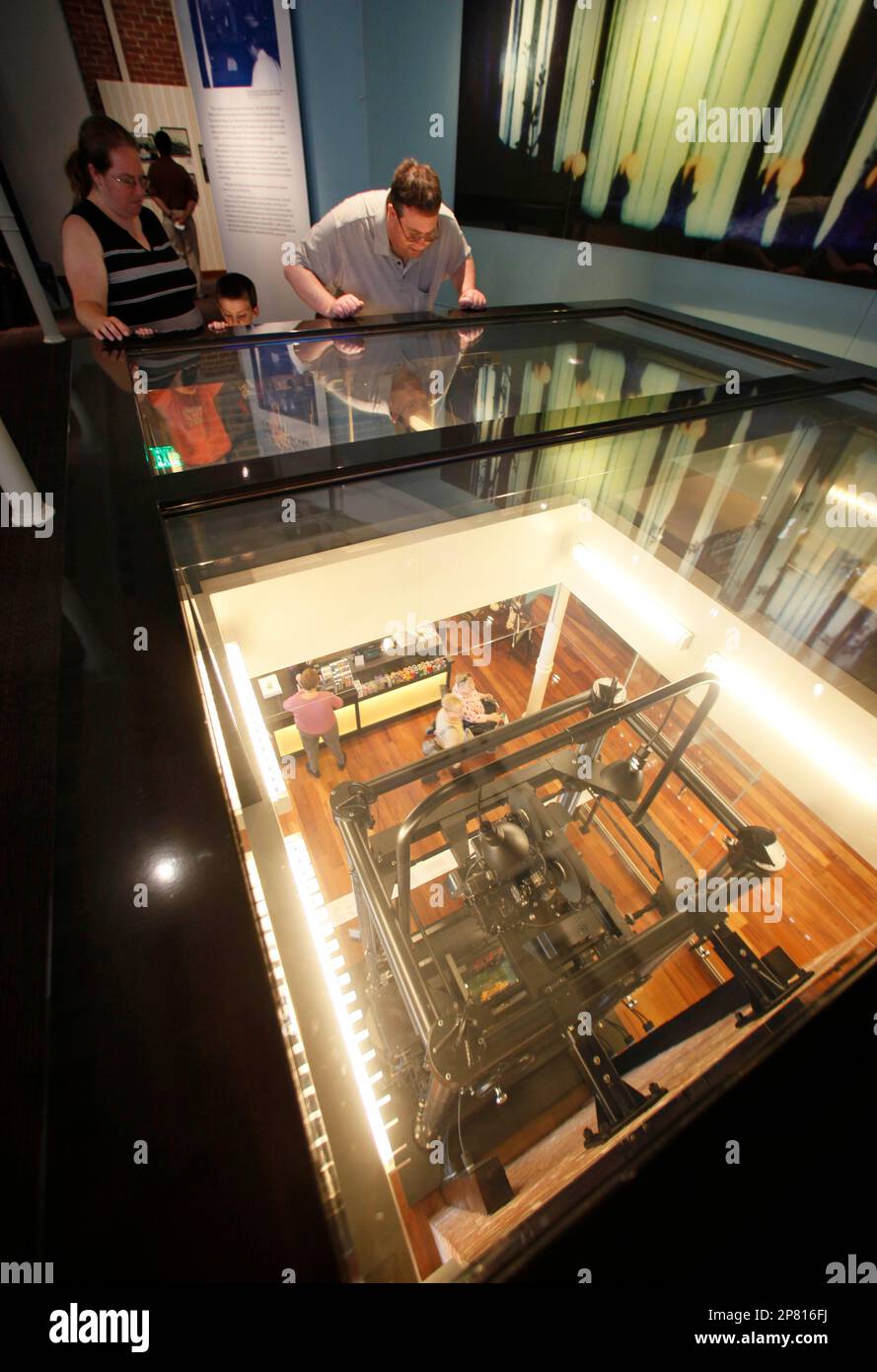 William Robison, right, of San Francisco, looks down on multiplane ...