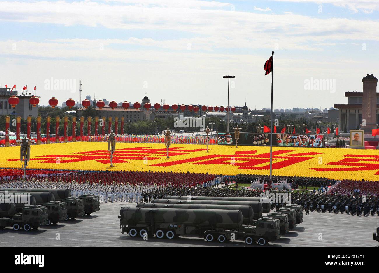 Missile launchers drives past Tiananmen Square during the military ...
