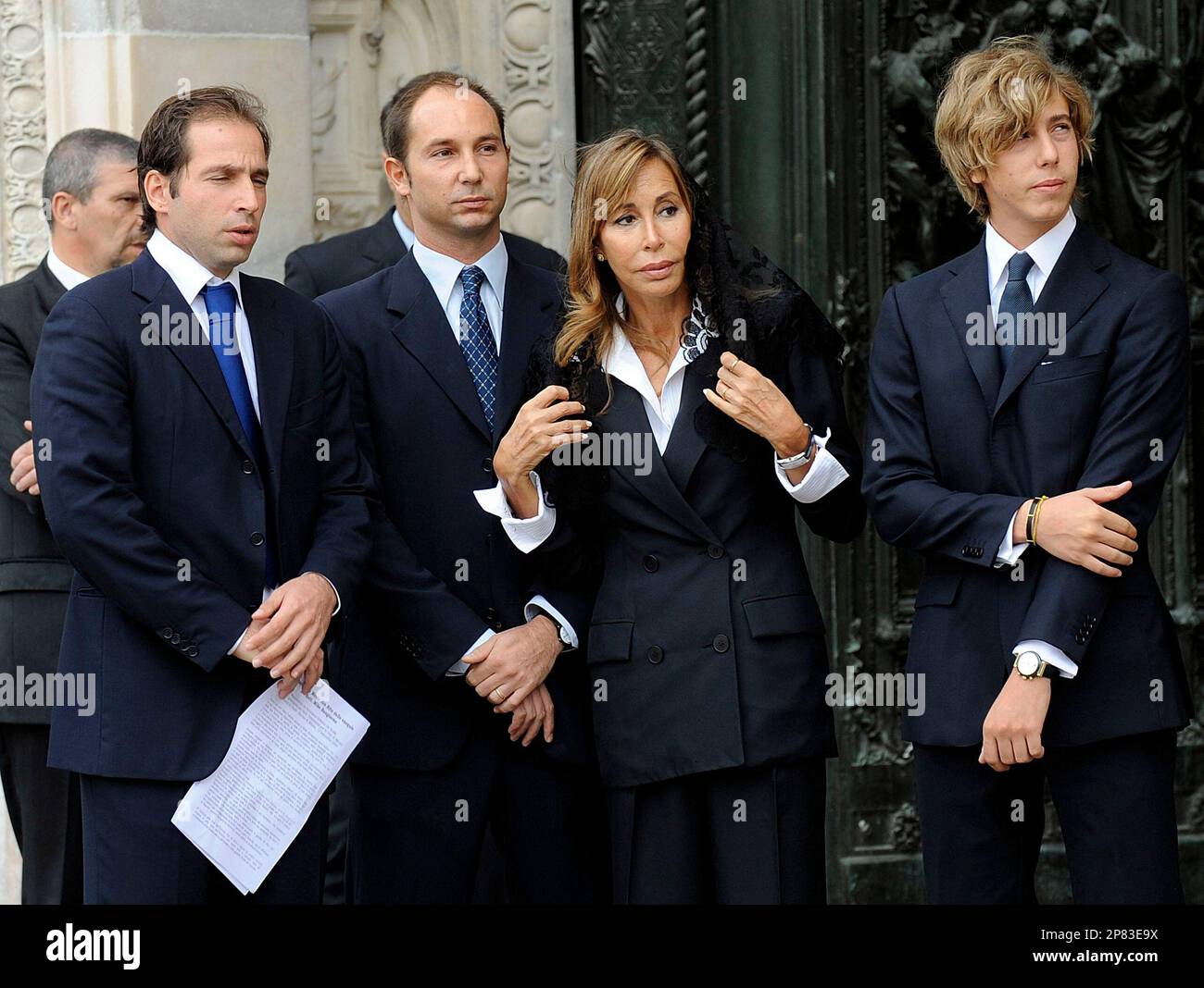 Daniela Zuccoli , the wife of Mike Bongiorno, center, is flanked by her ...