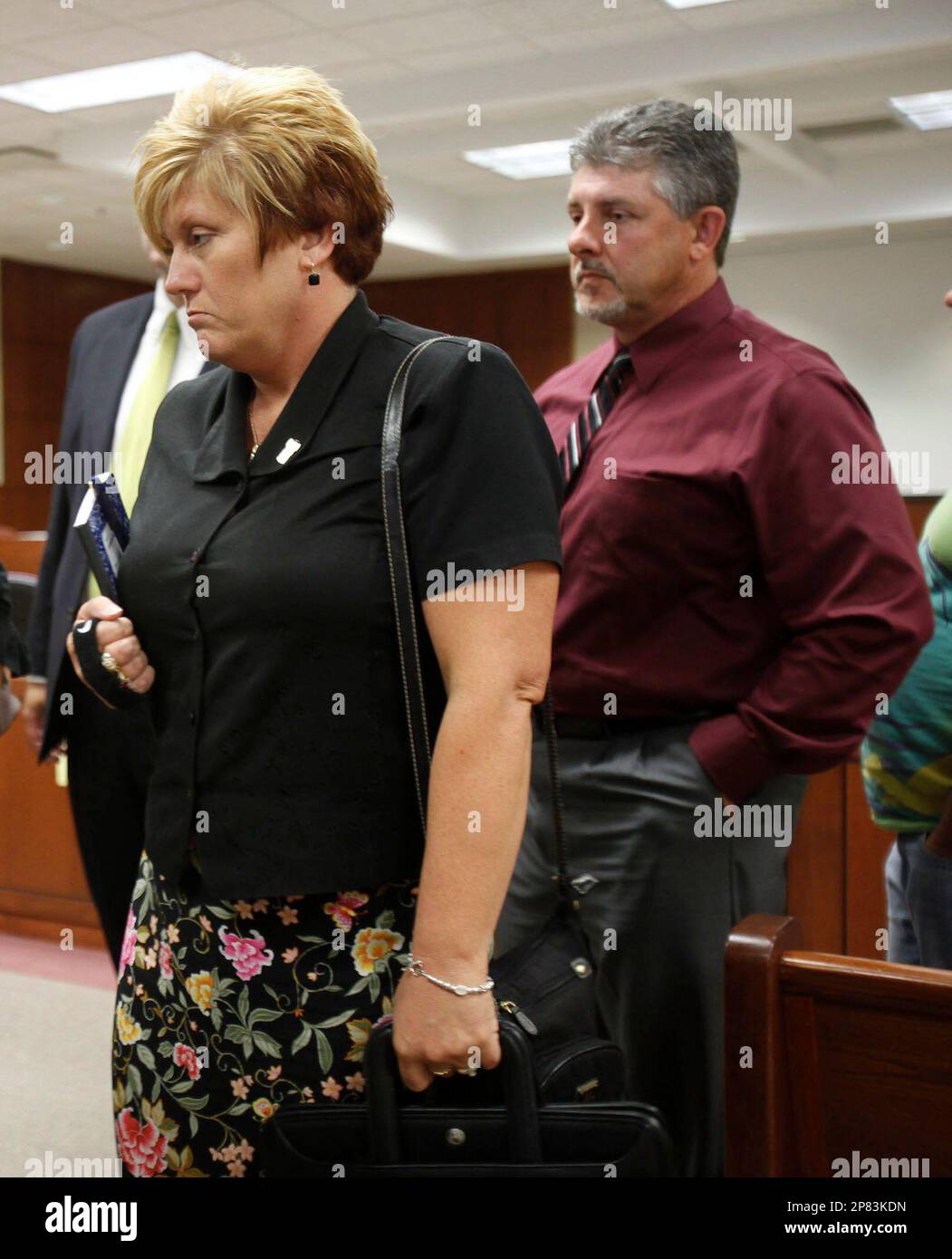 Michele Crockett, left, the mother of deceased Pleasure Ridge Park High ...