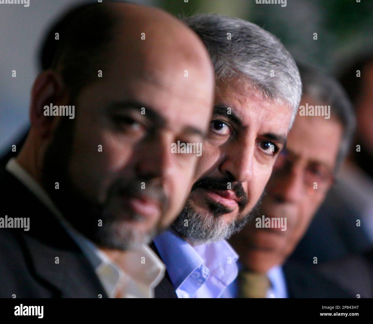 Khaled Meshaal , head of Hamas Politburo in Damascus, looks on during a ...