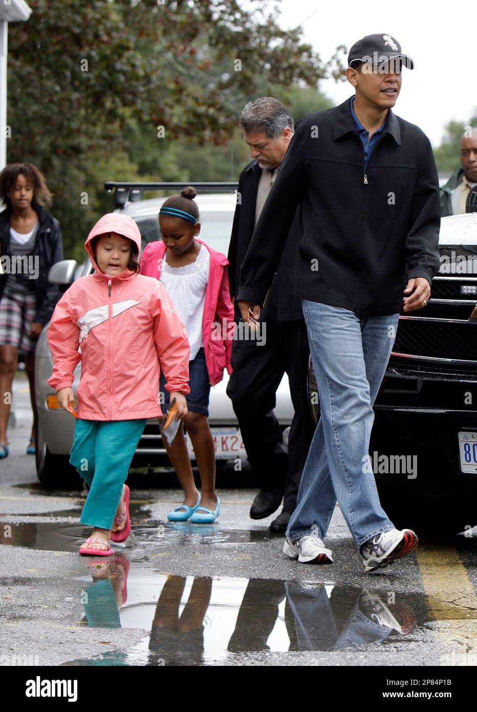 President Barack Obama and daughters Malia Obma, 11, far left, and ...