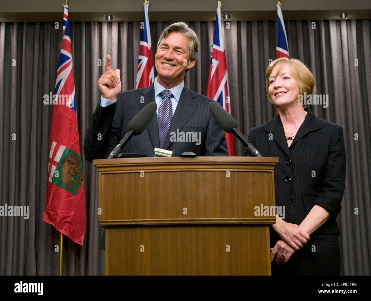 Manitoba Premier Gary Doer gestures during a news conference with his ...