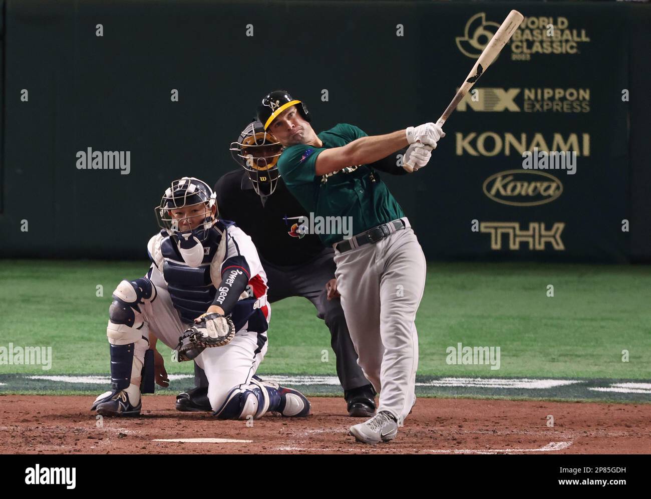 Australia's Tim Kennelly homers on a fly ball to left center field in ...