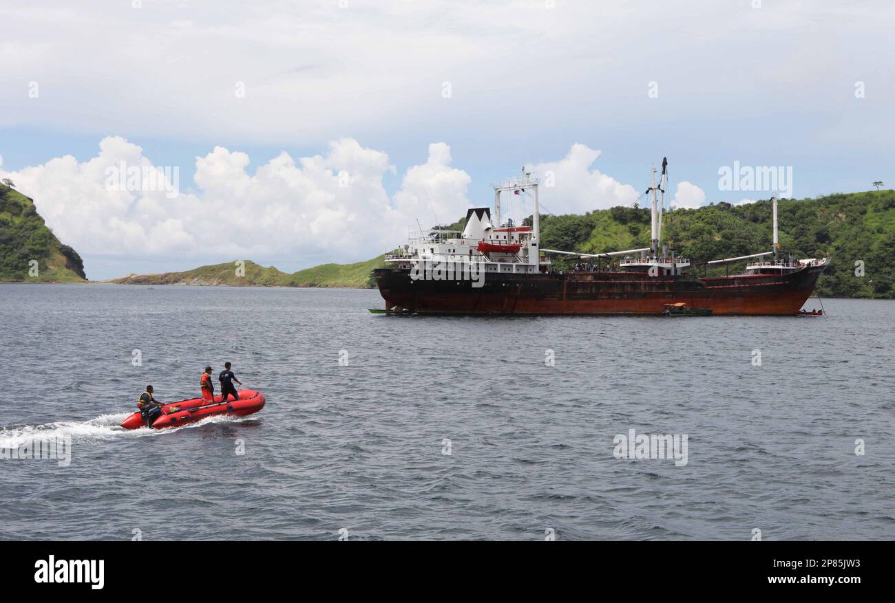 Philippine Coast Guard approaches the cargo ship M/V Captain Ufuk ...