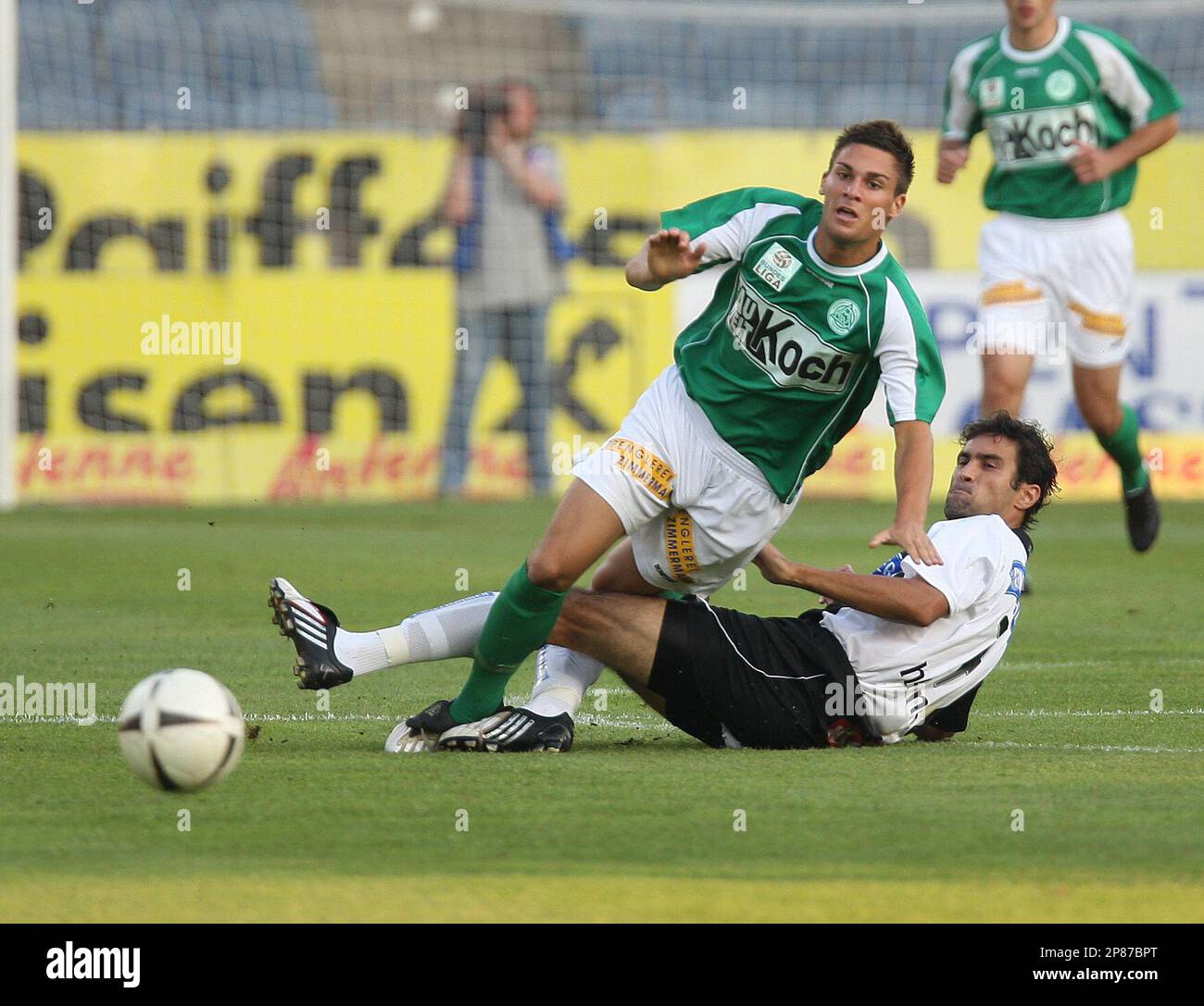 Sturm's Petr Hlinka, right, and Mattersburg's Manuel Seidl challenge ...