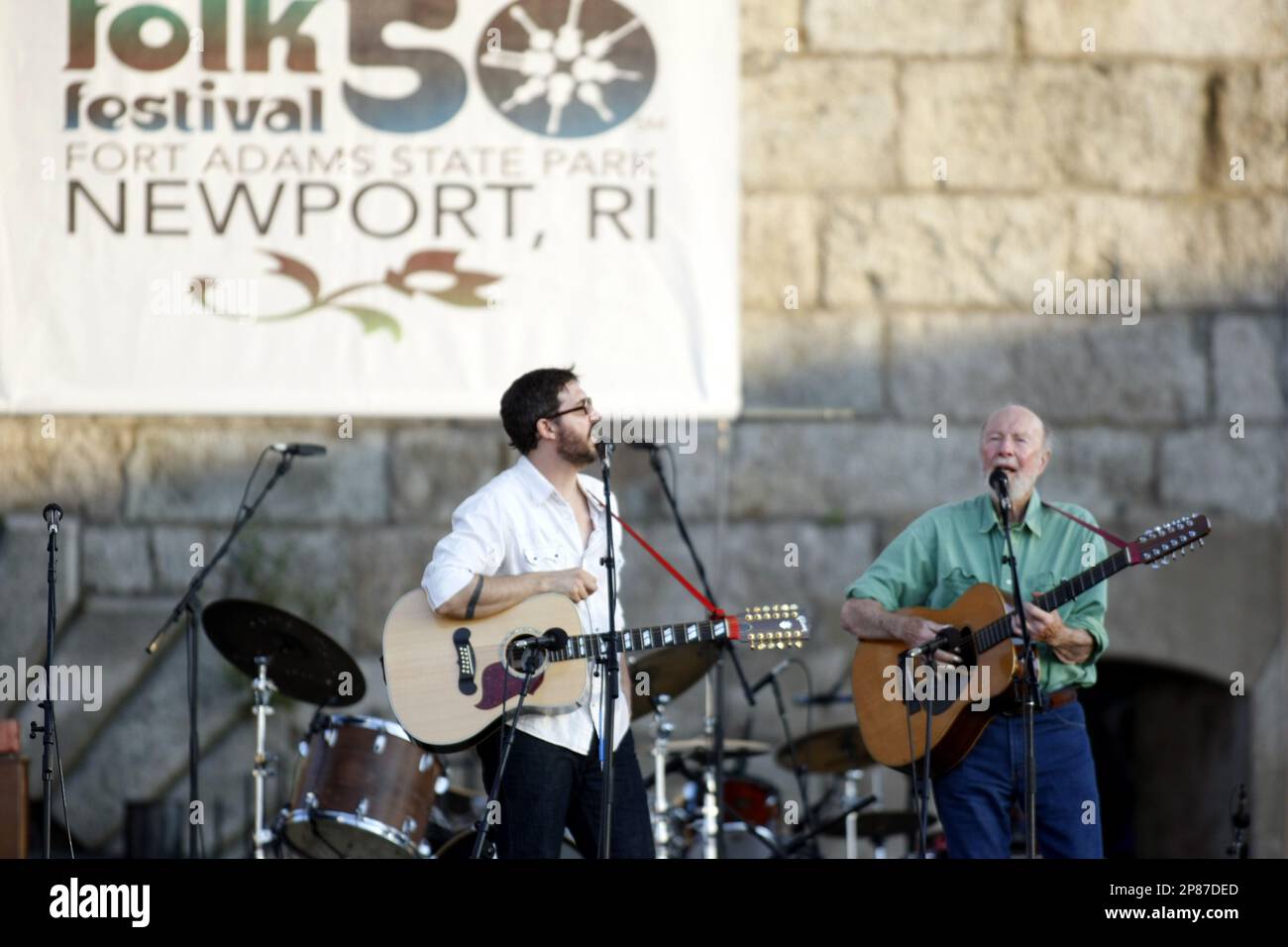 Pete Seeger, right, is joined on stage by his grandson Tao Rodriguez ...