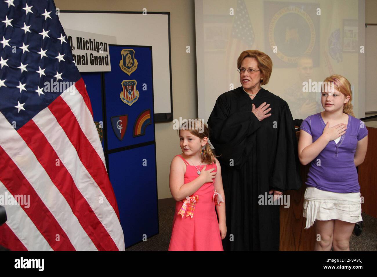 Michigan Supreme Court Chief Justice Marilyn Kelly, center, recites the ...
