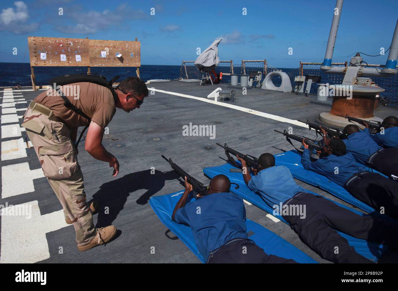 Gunners Mate First Class Benjamin O'Connor from Roanoke, Virginia look ...