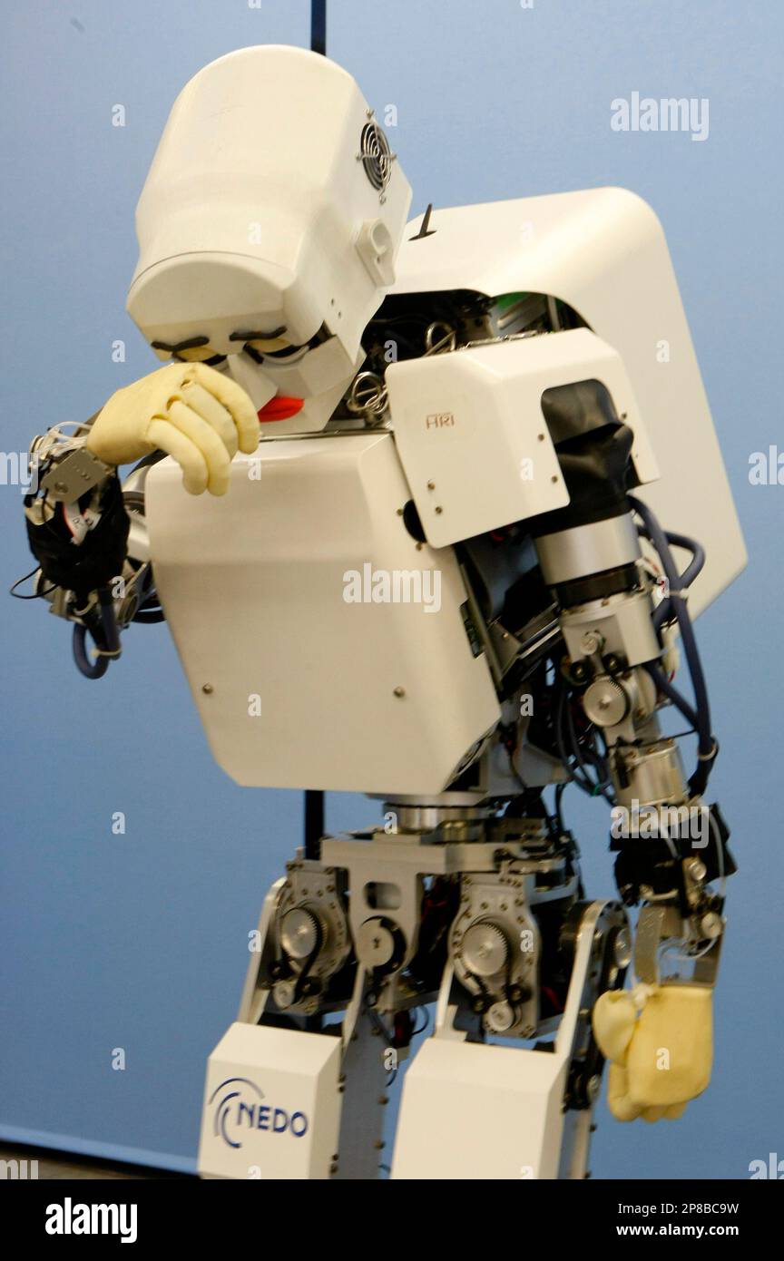 Humanoid robot KOBIAN displays an emotion of sadness during a ...