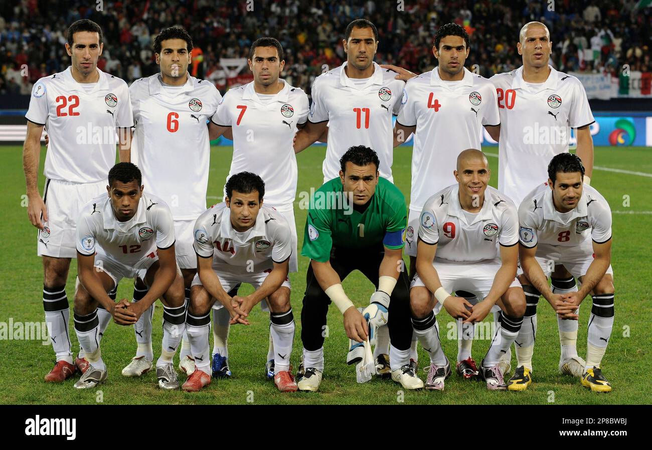 Front row from left, Egypt's Mohamed Homos, Sayed Moawad, goalkeeper ...