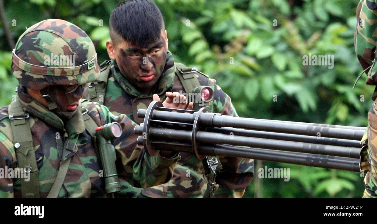South Korean Marines check a weapon at South Korea's western Yeonpyong ...