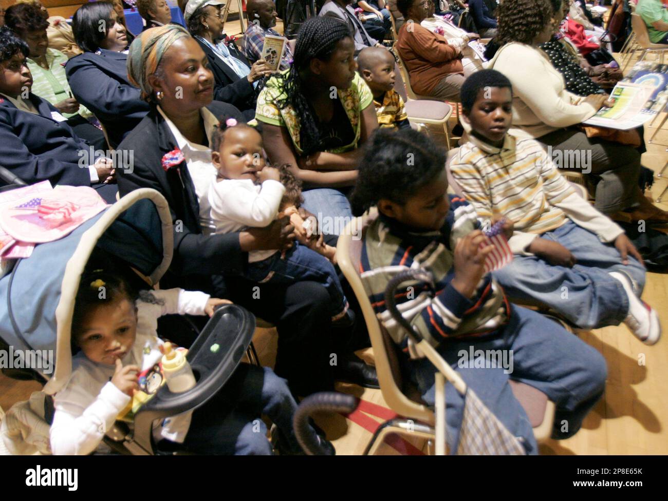 Barbara Waiters, second from left, sits with six of her 10 ...